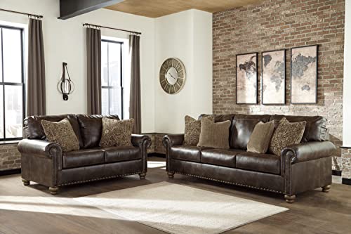 Signature Design by Ashley Nicorvo Traditional Faux Leather Sofa with Gold Nailhead Trim, Brown