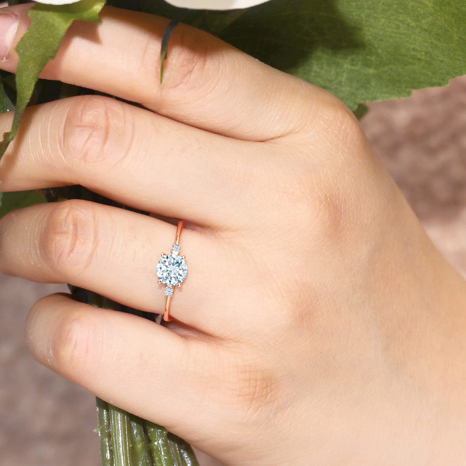Gem Stone King 10K Rose Gold Sky Blue Aquamarine and White Created Sapphire Solitaire Engagement Ring For Women (0.78 Cttw, Round 6MM, Gemstone March Birthstone, Size 6)