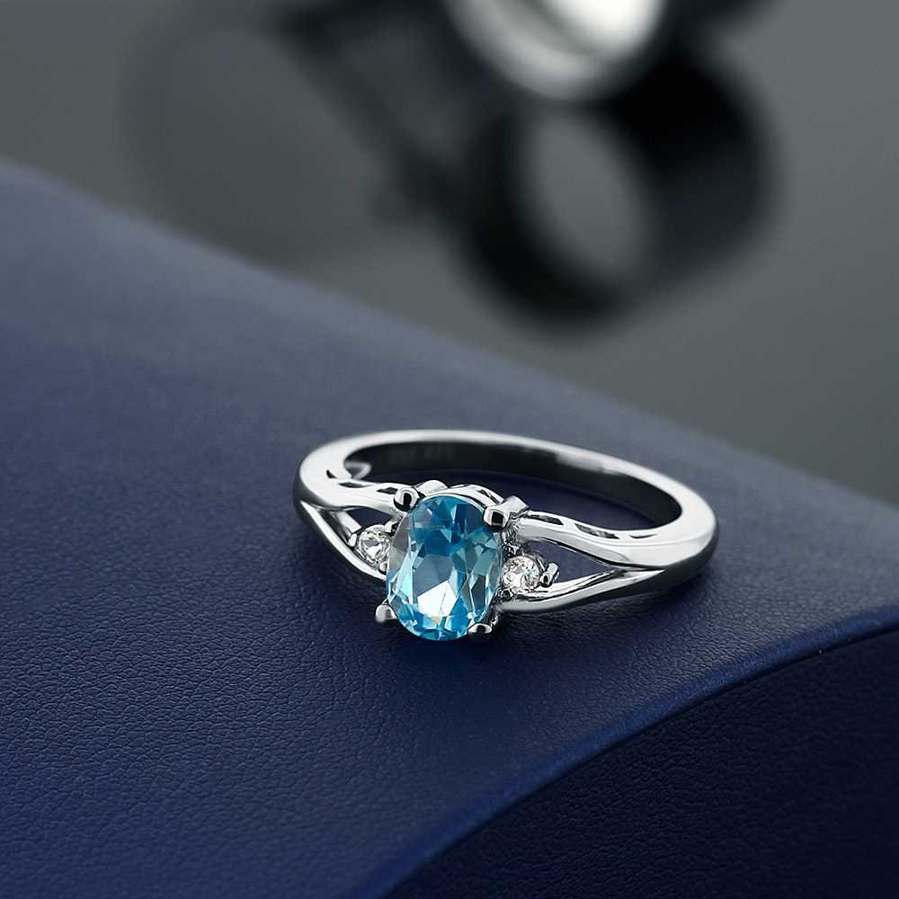 Gem Stone King 925 Sterling Silver Swiss Blue Topaz and White Topaz 3-Stone Ring For Women (1.80 Cttw, Center: 8X6MM Oval, Gemstone Birthstone, Available In Size 5, 6, 7, 8, 9)