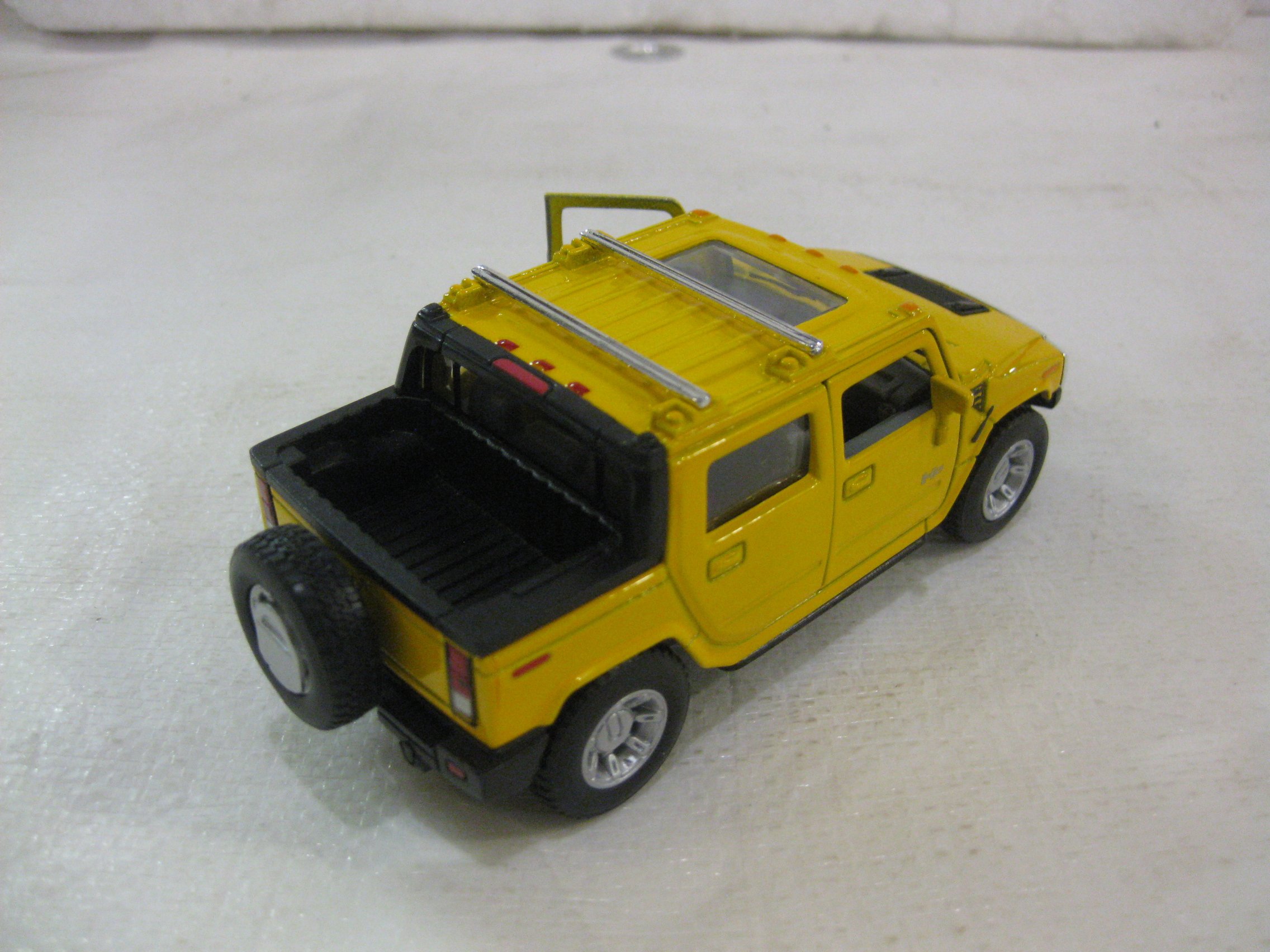 KiNSMART 2005 H2 Hummer SUT Yellow 5" 1:40 Scale w/Pull Back Action