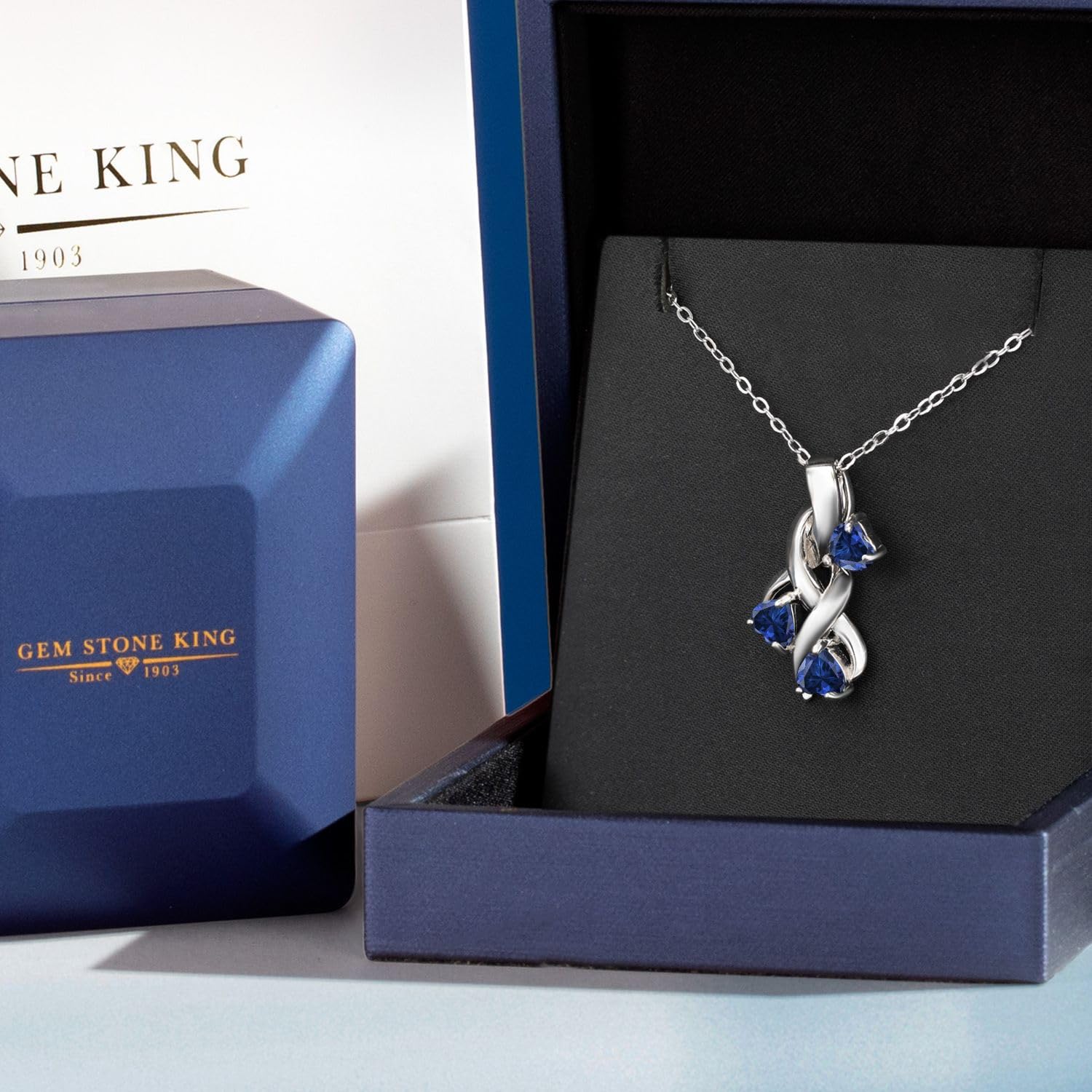 Gem Stone King 925 Sterling Silver Blue Created Sapphire Pendant For Women (1.50 Cttw, Gemstone September Birthstone, Heart Shape 5MM, 18 Inch Chain)