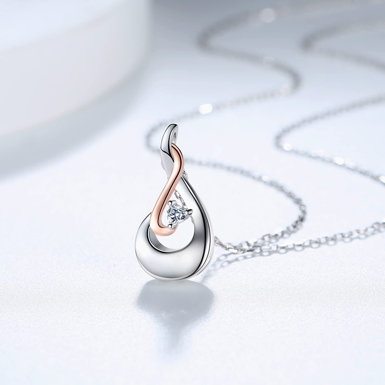 Hioed 925 Sterling Silver Cremation Jewelry for Ashes Teardrop Urn Necklace for Ashes with Heart-Shape CZ Memorial Keepsakes Pendant Necklace for Women(White-April)