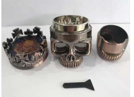 Skull herb grinder - Manual spice grinder for fast and easy grinding of herbs and spices - Makes a great novelty gift item for Halloween decor enthusiast (Red)