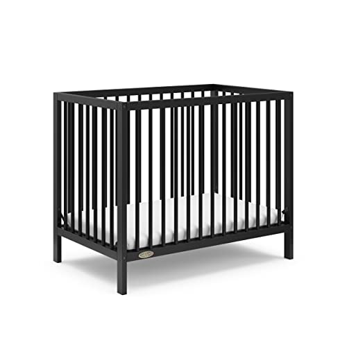 Graco Teddi 4-in-1 Convertible Mini Crib with Bonus Water-Resistant Mattress (Black) โ GREENGUARD Gold Certified, 2.75-Inch Mattress Included, Convenient Size, Easy 30-Minute Assembly