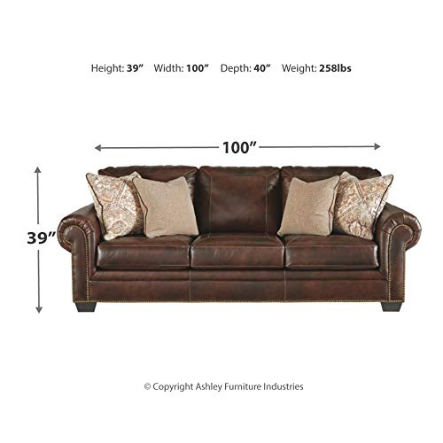 Signature Design by Ashley Roleson Traditional Leather Queen Sofa Sleeper with Nailhead Trim and 4 Accent Pillows, Brown