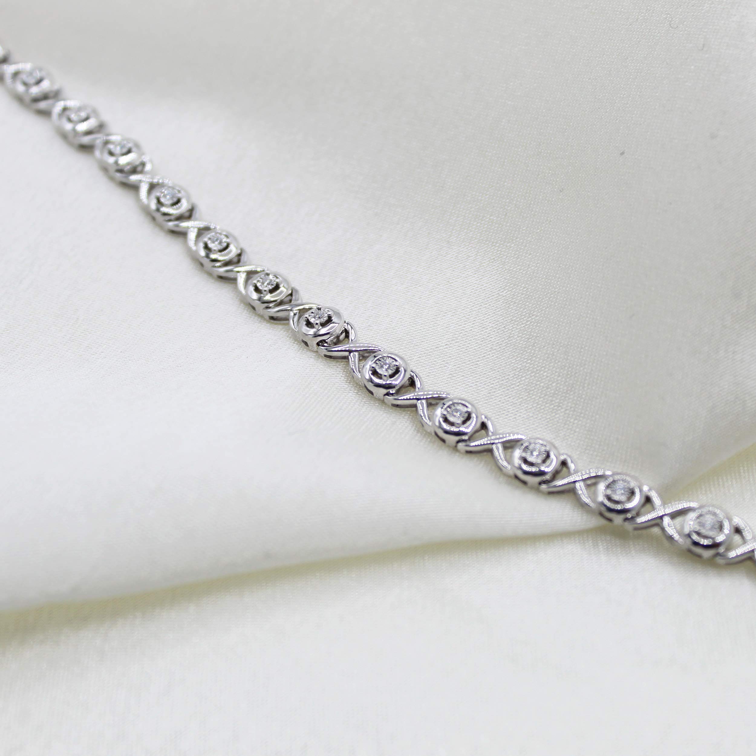 Fifth and Fine 1/6 Carat tw Natural Diamond XO Tennis Bracelet in 925 Sterling Silver