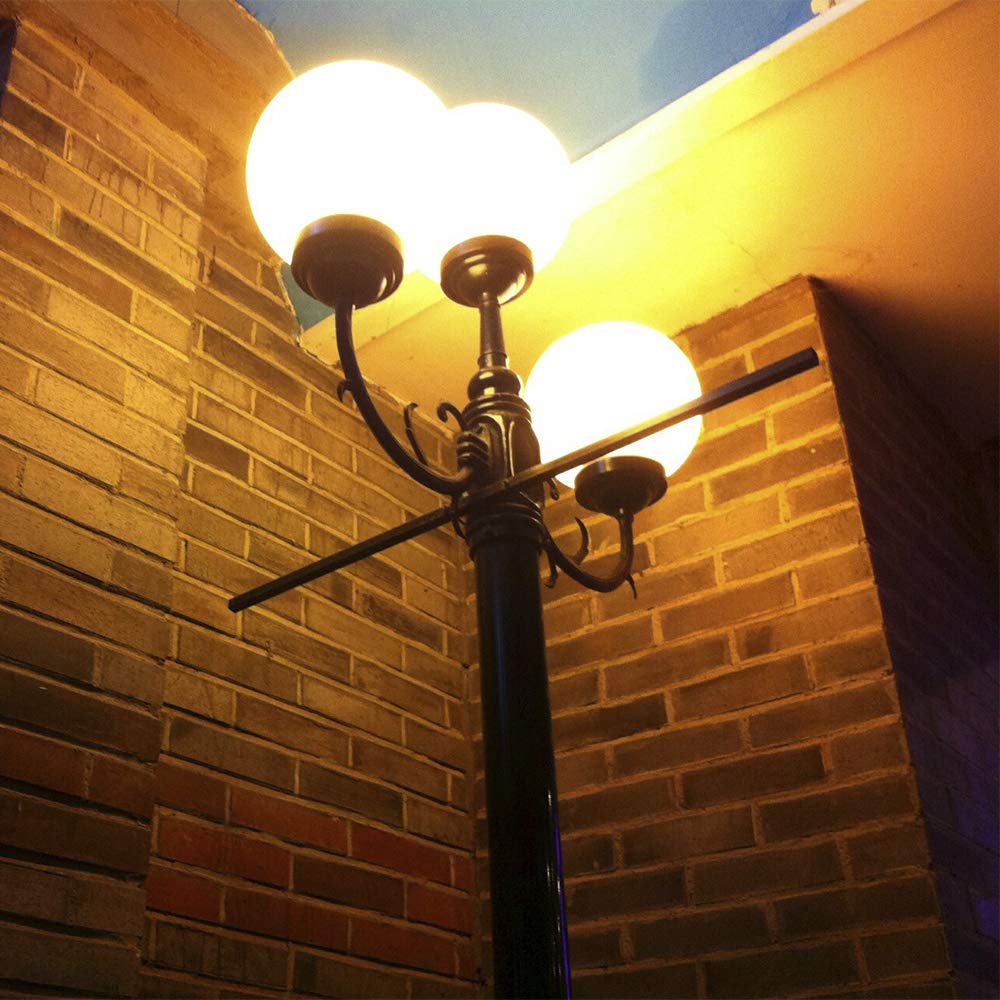 FAGUANGAO Dusk to Dawn Sensor Bug Light Bulb, A19 Yellow LED Bulb, 7W Equivalent 60W Auto On/Off Amber Light Bulb for Outdoor Backyard, Porch, Patio, Garage, 2000k, E26 Base, 4 Pack