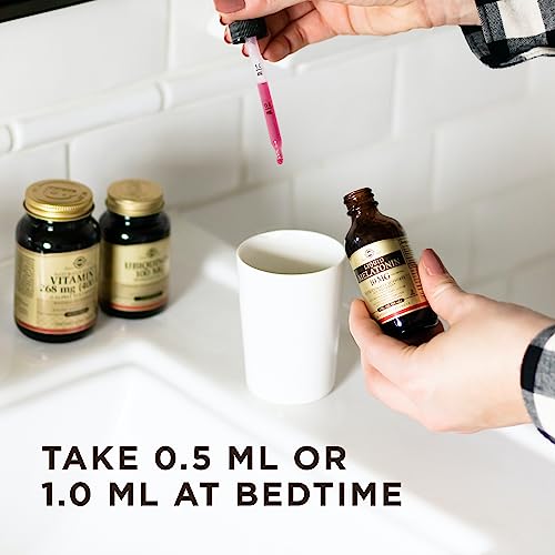SOLGAR Liquid Melatonin 10 mg, Natural Black Cherry Flavor - 2 fl oz - Helps Normal Circadian Rhythm - Great for Jet Lag - Vegan, Gluten & Dairy Free, Kosher - 59 Servings