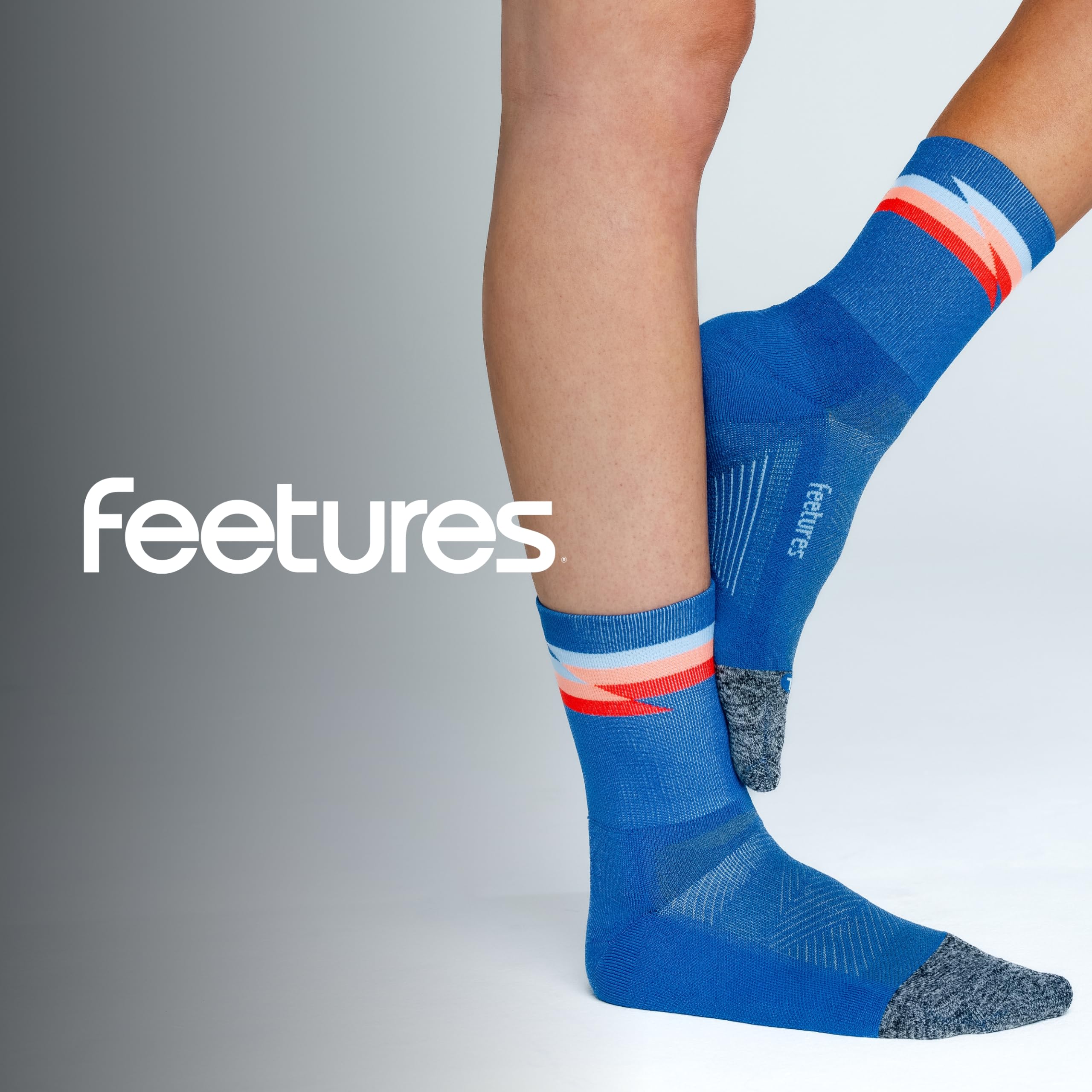 Feetures Elite Light Cushion Mini Crew Sock - Sport Sock with Targeted Compression - Large, Black (1 Pair)