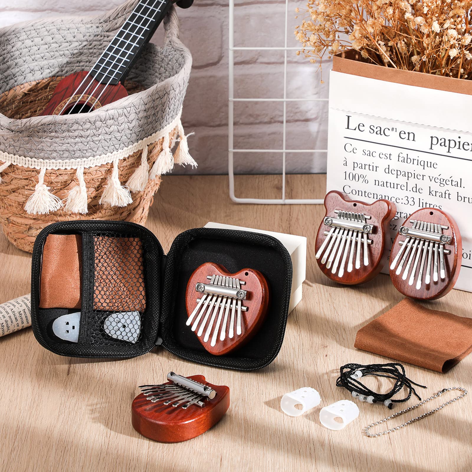 Konohan 24 Pcs 8 Keys Mini Kalimba Piano Set, Include 4 Mini Exquisite Finger Thumb Piano 4 Lanyard 4 Chains 8 Finger Protector 4 Cleaning Cloth for Kids Adults Beginners Gift (Cute Style)