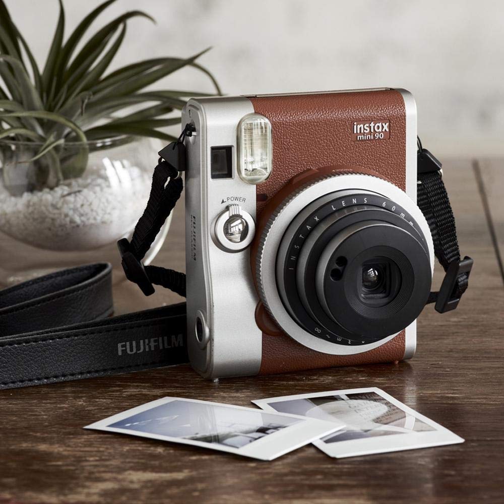 Fujifilm INSTAX Mini 90 Neo Classic Instant Camera (Brown) + Fujifilm Instax Mini Instant Film (20 Exposures) + Compact Camera Case + Sticker Frames Sports Package + Photo4Less Cleaning Cloth