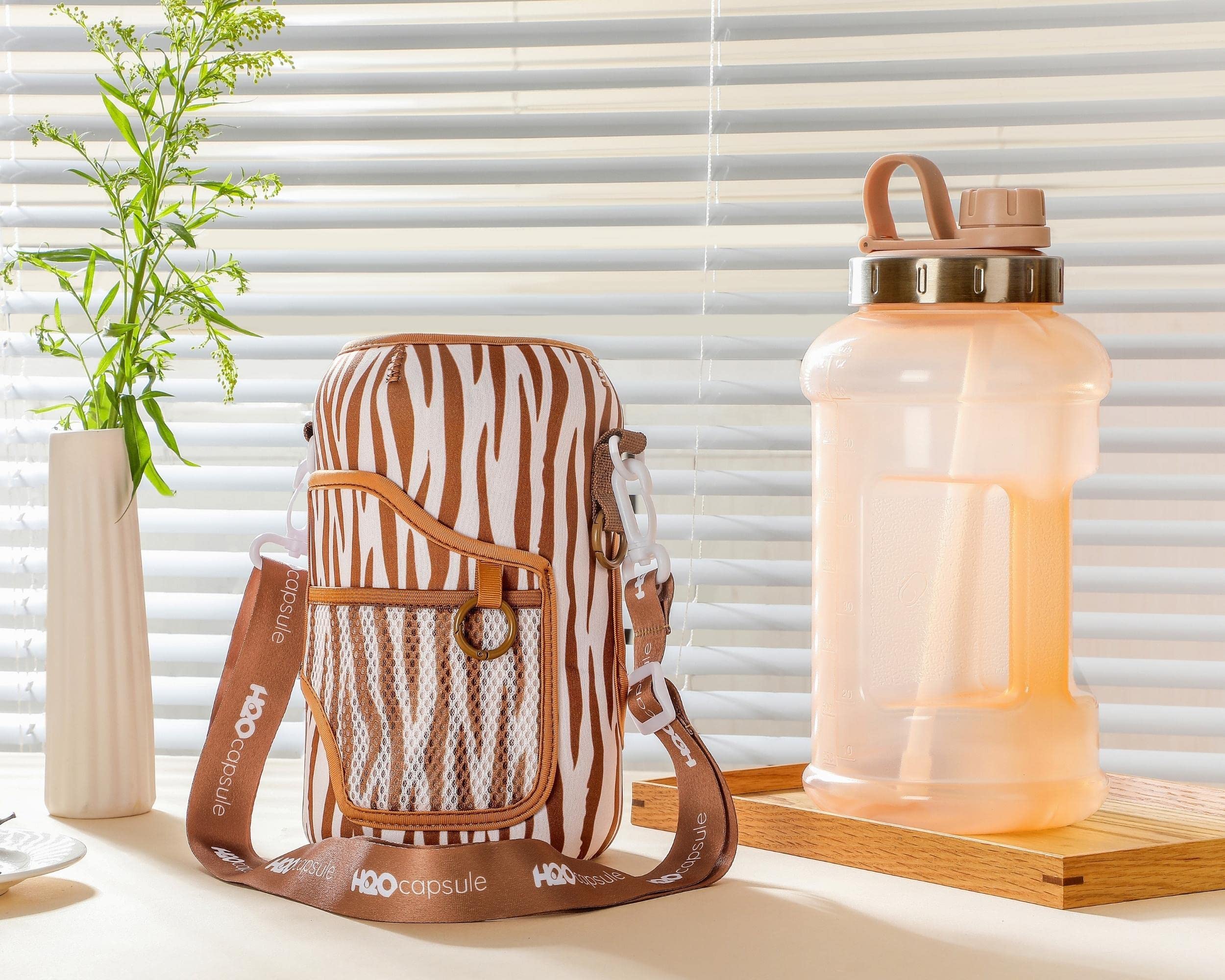 H2O Capsule 2.2L Half Gallon Wide Mouth Water Bottle with Storage Sleeve and Removable Straw - Hydration Tracker Jug with Measurements Marked β Shatterproof BPA-Free, (Libra Zebra)