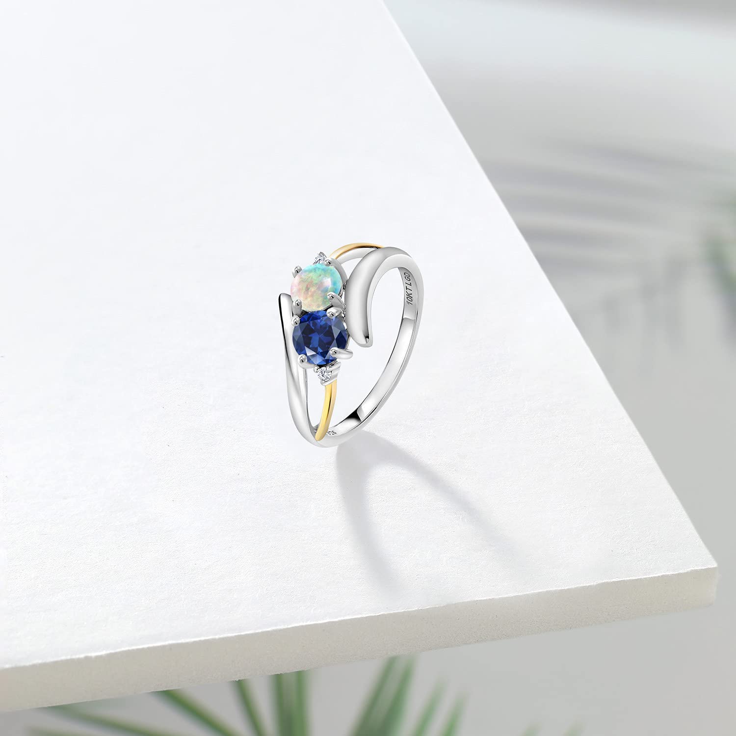 Gem Stone King 925 Silver and 10K Yellow Gold Round Cabochon White Simulated Opal Blue Created Sapphire and White Lab Grown Diamond 2 Stone Crossover Ring (1.12 Cttw, Available In Size 5, 6, 7, 8, 9)