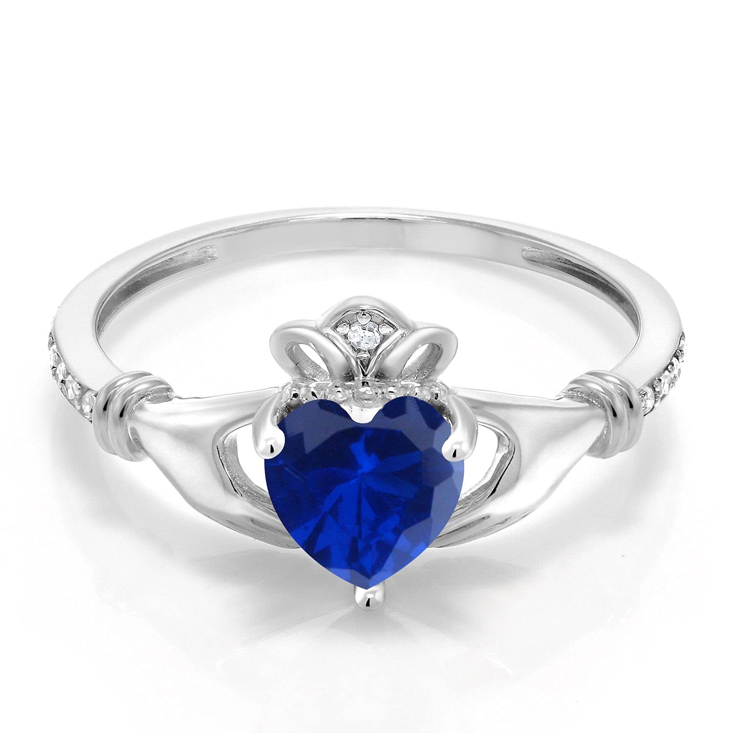 Gem Stone King 10K White Gold Blue Created Sapphire and White Diamond Irish Celtic Claddagh Ring For Women (0.86 Cttw, Heart Shape 6MM, Gemstone Birthstone, Available in size 5, 6, 7, 8, 9)
