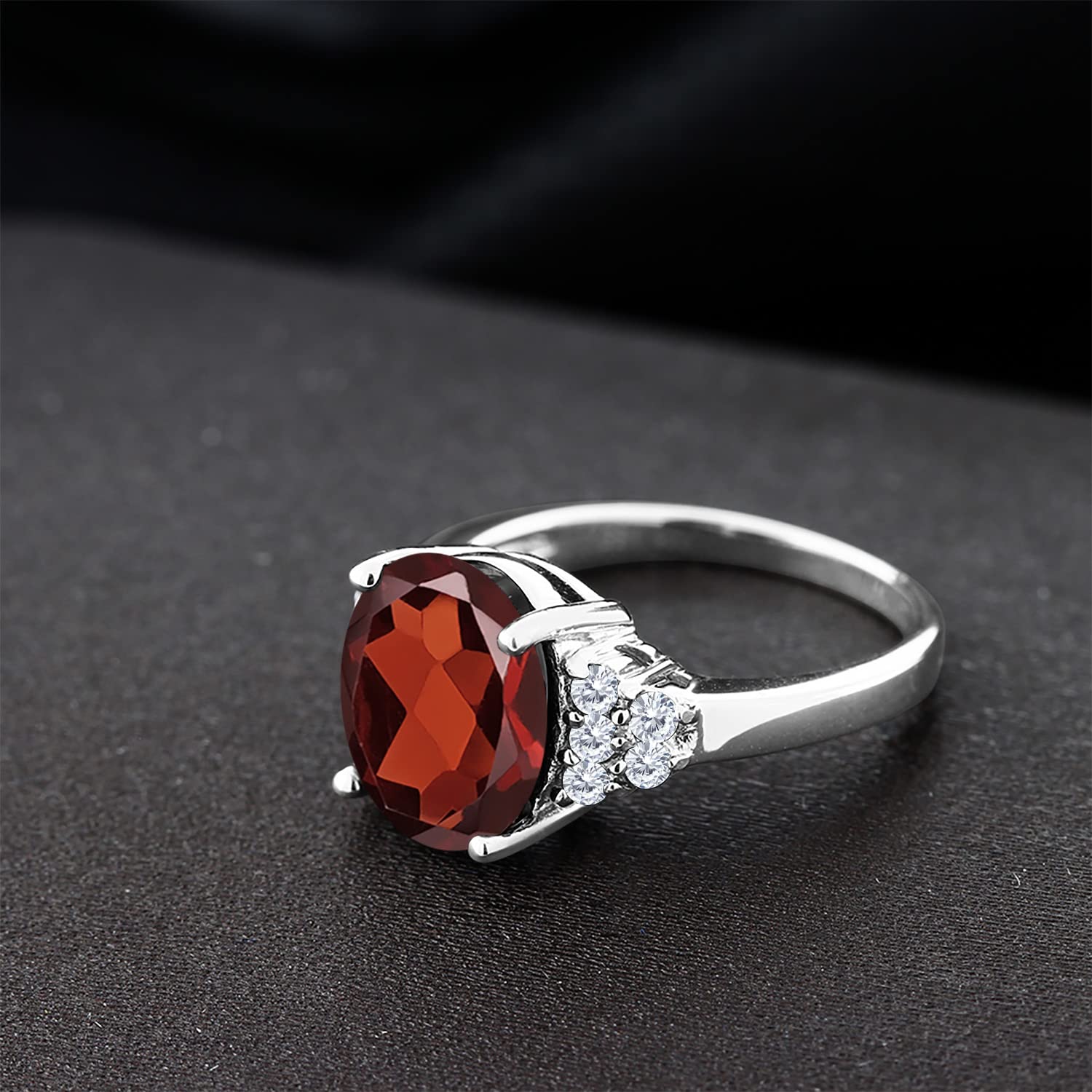 Gem Stone King 925 Sterling Silver Oval Red Garnet and White Moissanite Ring For Women (5.88 Cttw, Gemstone Birthstone, Available In Size 5, 6, 7, 8, 9)