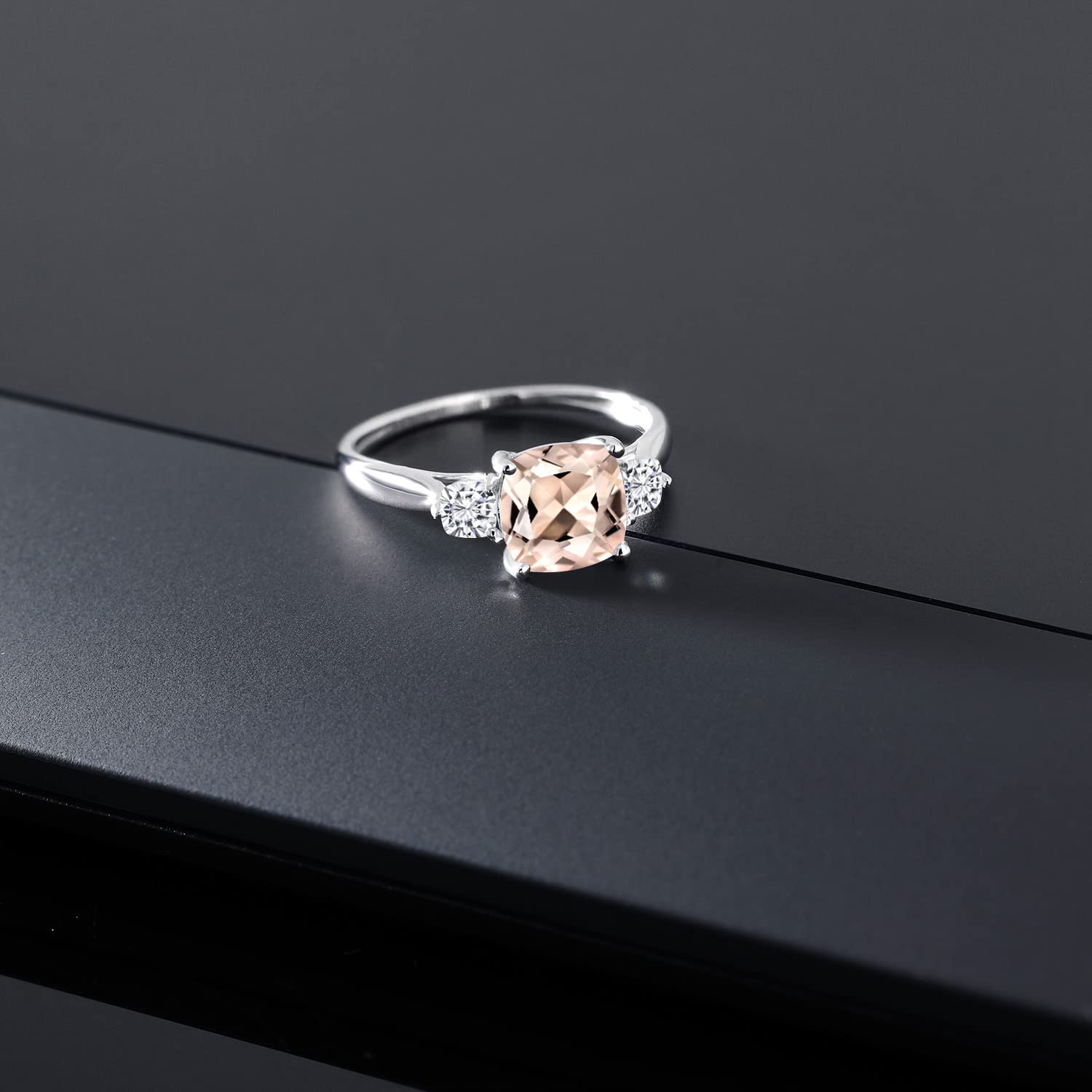 Gem Stone King 10K White Gold Peach Morganite and Forever Classic Moissanite 3 Stone Engagement Ring For Women (1.56 Cttw, Cushion 7MM, Gemstone October Birthstone) (Size 6)