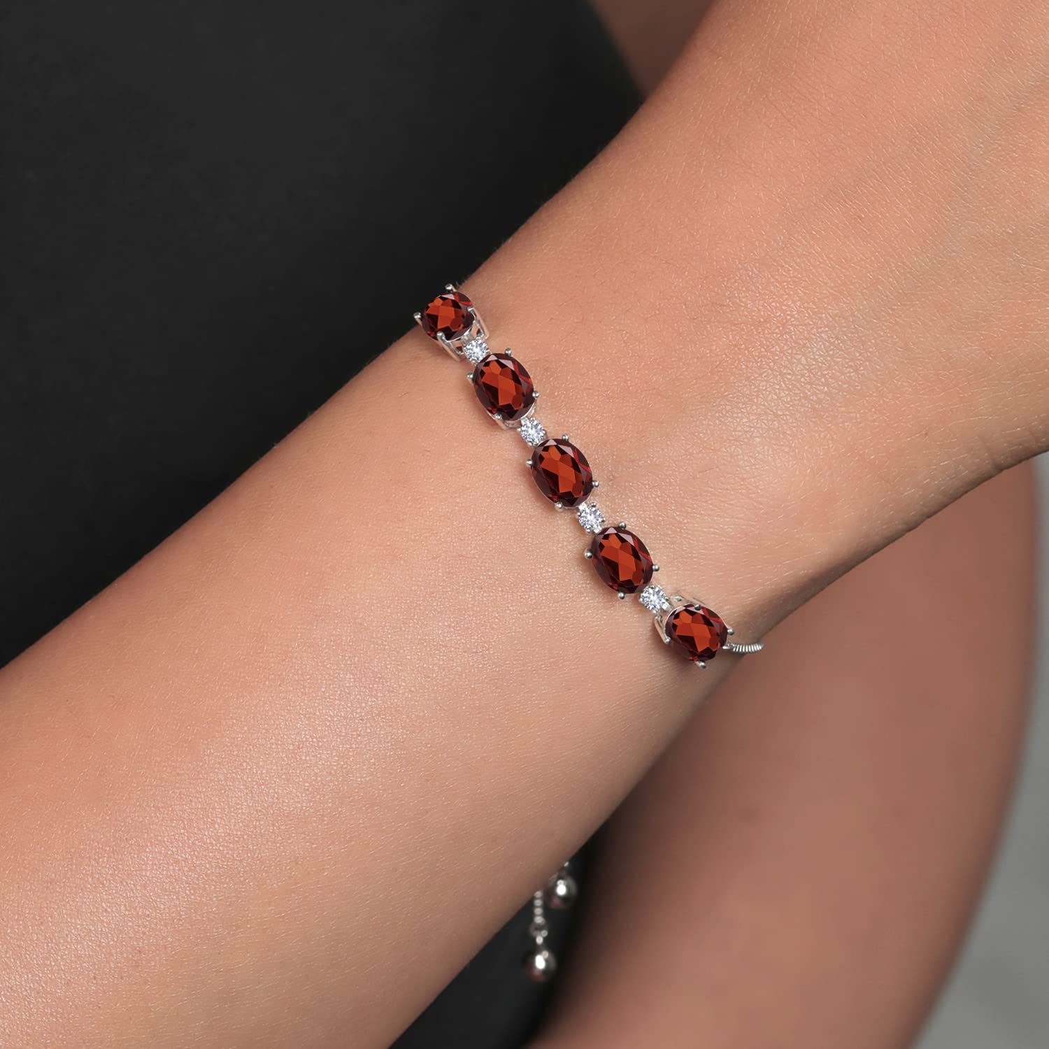 Gem Stone King 925 Sterling Silver Red Garnet and White Created Sapphire Tennis Bracelet For Women (7.70 Cttw, Oval 8X6MM, Gemstone Birthstone, Fully Adjustable Up to 9 Inch))