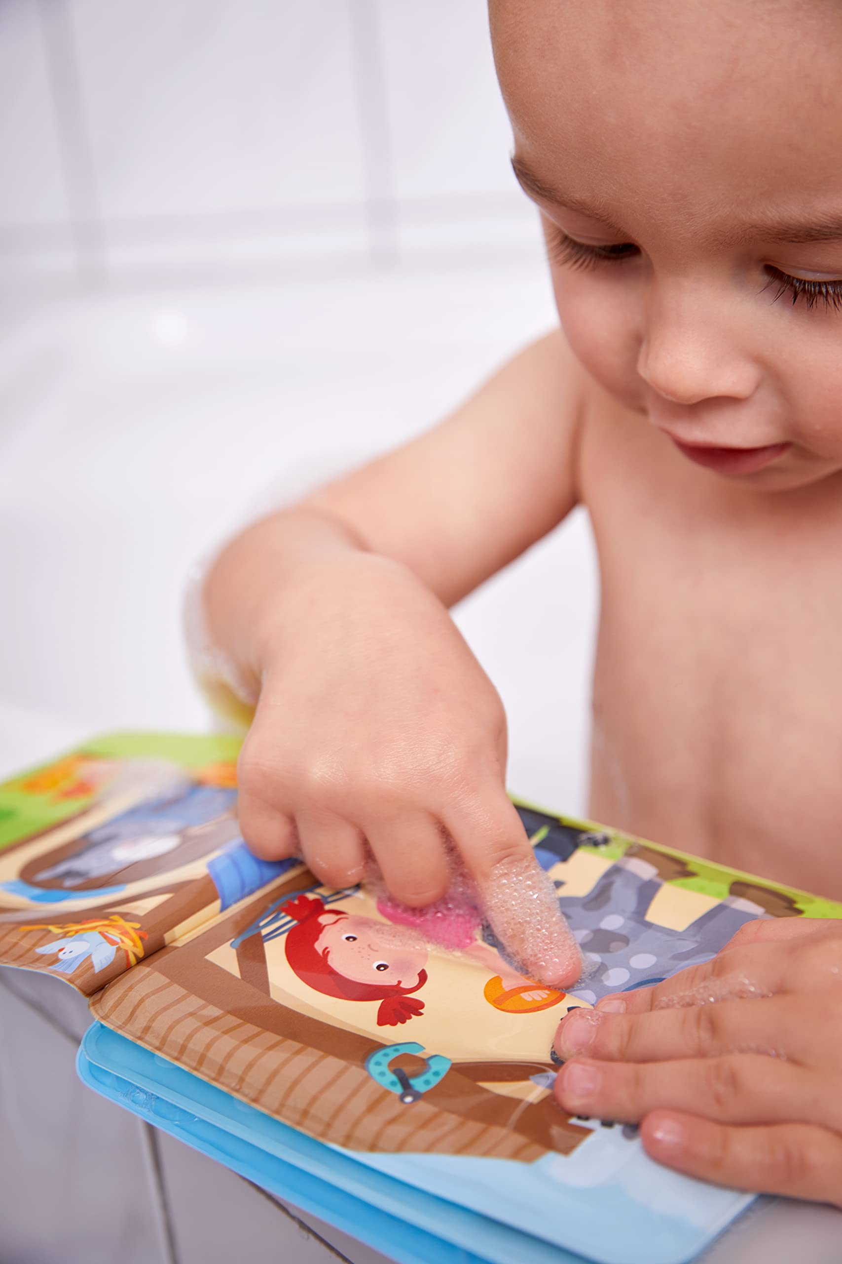 HABA Animal Wash Day - Magic Bath Book - Wipe with Warm Water and the "Muddy" Pages Come Clean