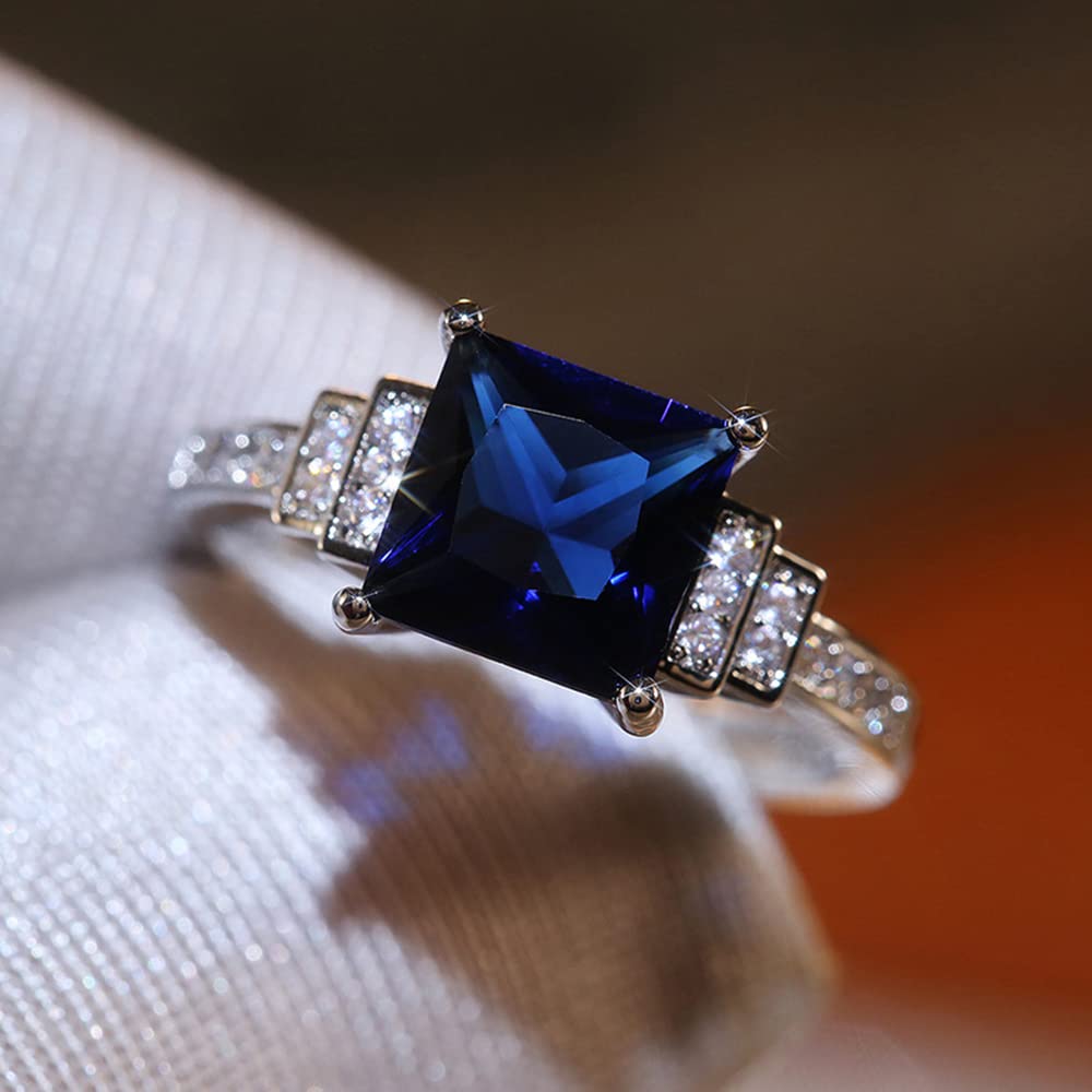 Koguxuix 14K White Gold Plated Sterling Silver Perfect Princess Cut Blue Sapphire Round Clear CZ Crystal Diamond Women's Engagement Ring (Size 8)