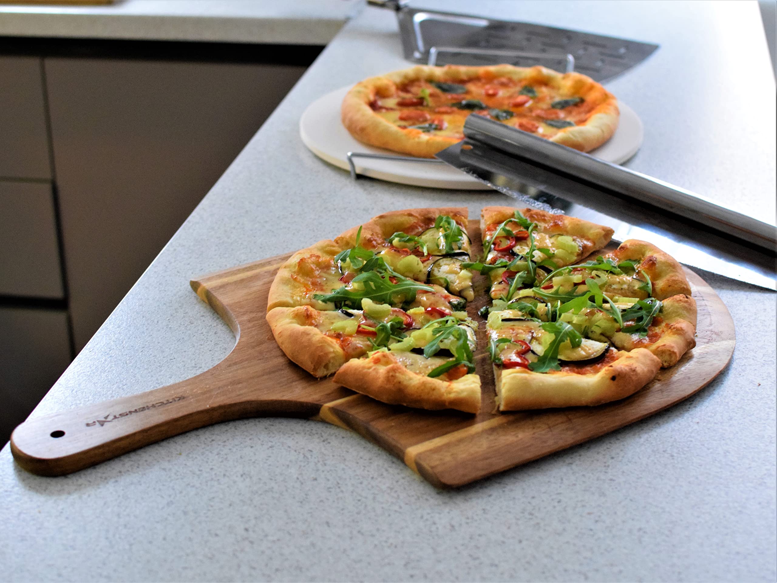 KitchenStar Pizza Stone for Oven and Grill 15x12 inch + Pizza Cutter Rocker 14" + Acacia Wood Pizza Peel 14" - Pizza Making Set Bundle - Premium Pizza Oven Accessories and Tools