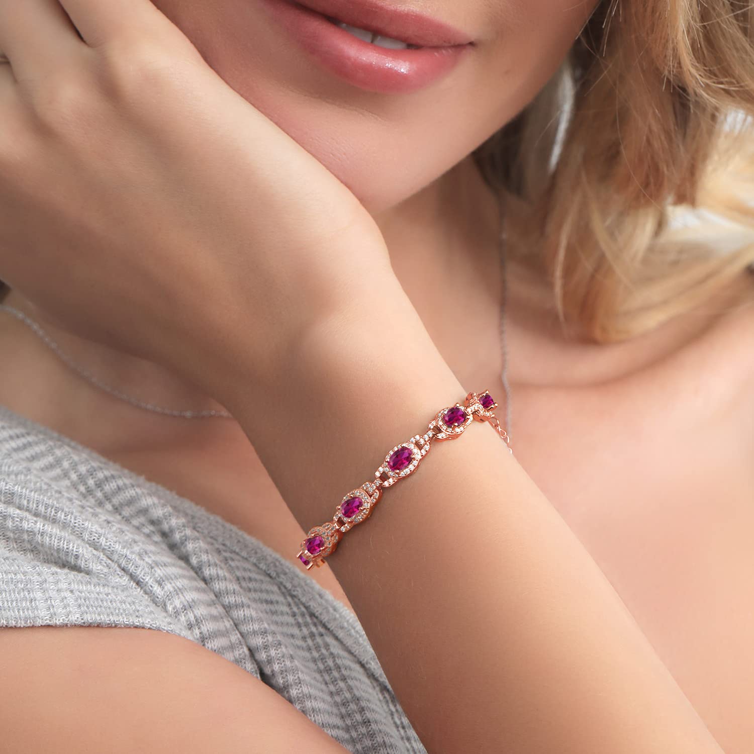 Gem Stone King 18K Rose Gold Plated Silver Red Created Ruby Tennis Bracelet For Women (14.60 Cttw, Oval 6X4MM, 7 Inch, With 1 Inch Extender)