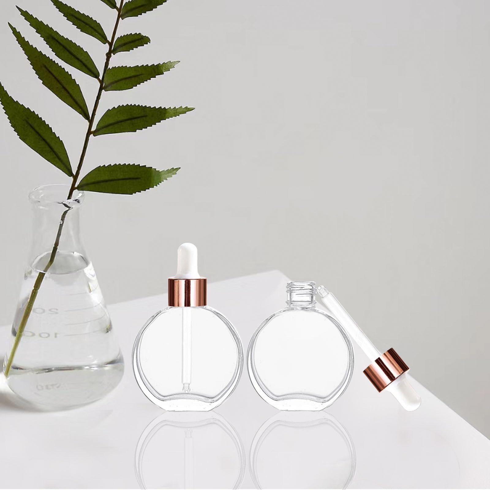 PYAWI 6Pcs, 2 oz Glass Dropper Bottles for Essential Oils ,60ml flat round perfume bottle with Eye Droppers, for Essential Oils, Perfumes, Serums - Leakproof for Travel (A- Clear/Rose Gold)