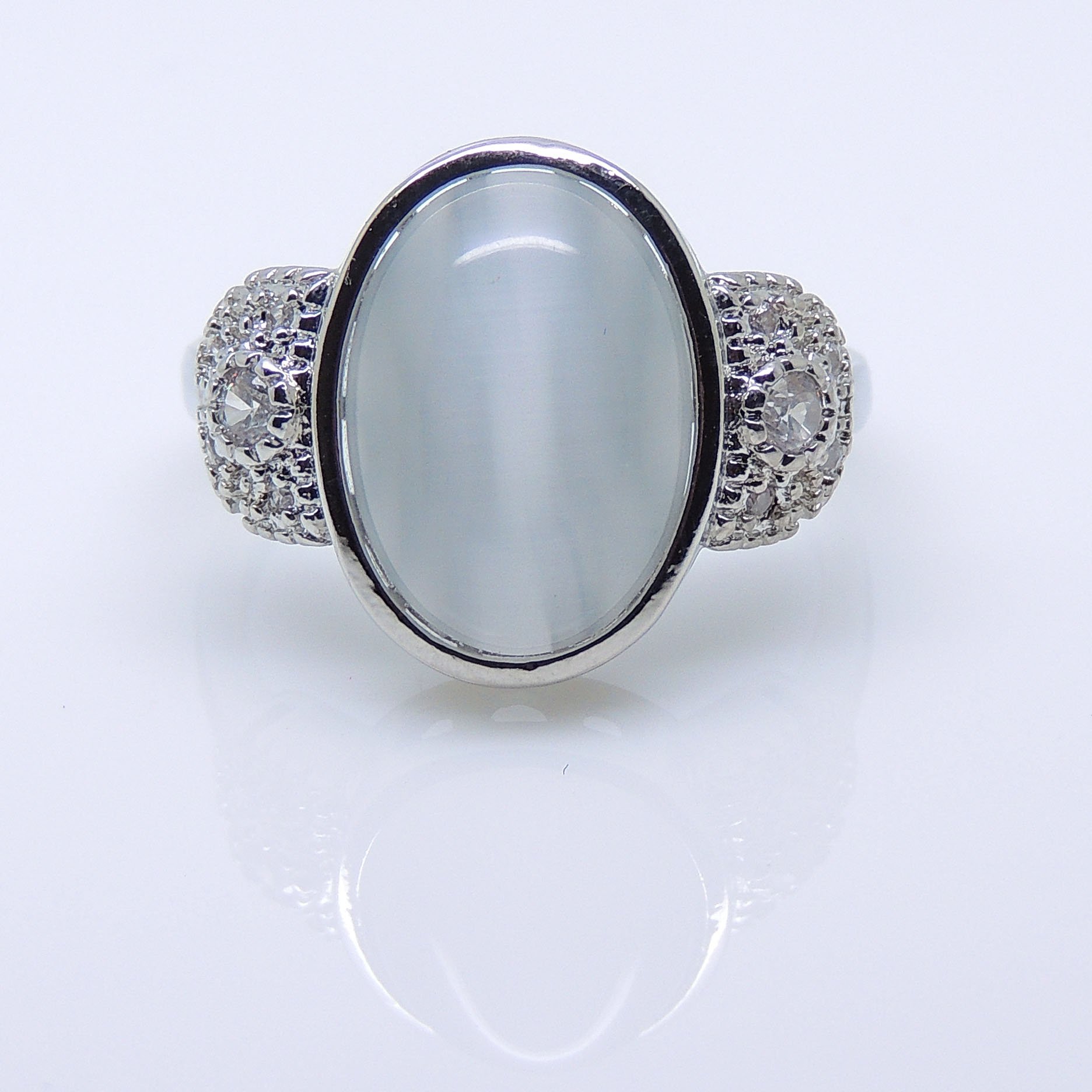 Ginger Lyne Collection Cory Oval Shape Simulated Fire Opal with Clear Accents Ring Size 9