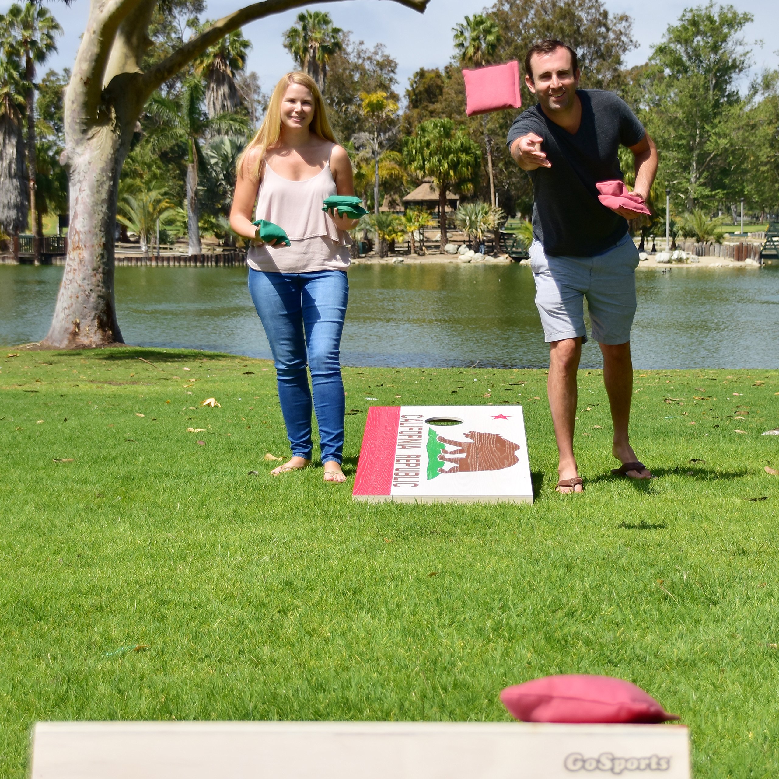 GoSports Flag Series Wood Cornhole Sets β Choose American Flag or State Flags β Includes Two Regulation Size 4 ft x 2 ft Boards, 8 Bean Bags, Carrying Case and Rules
