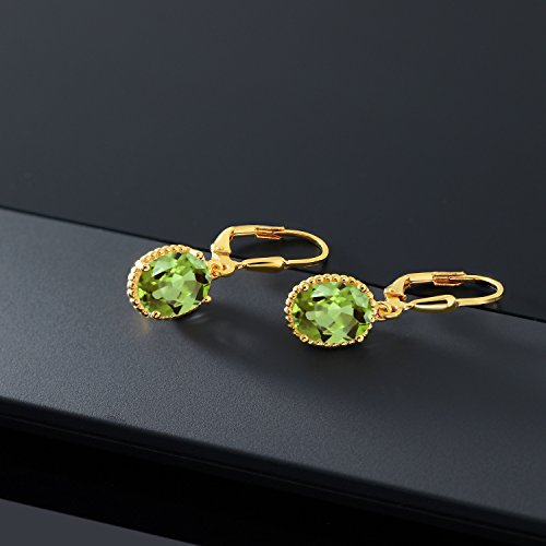 Gem Stone King 18K Yellow Gold Plated Silver Green Peridot Leverback Dangle Earrings For Women (4.20 Cttw, Gemstone August Birthstone, Oval 9X7MM)