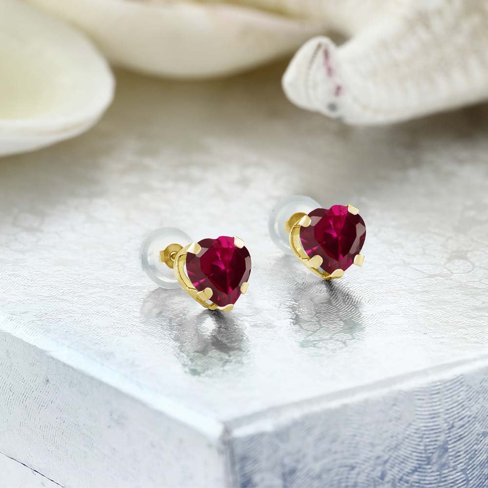 Gem Stone King 10K Yellow Gold Red Created Ruby Stud Earrings For Women (1.92 Cttw, Heart Shape 6MM)