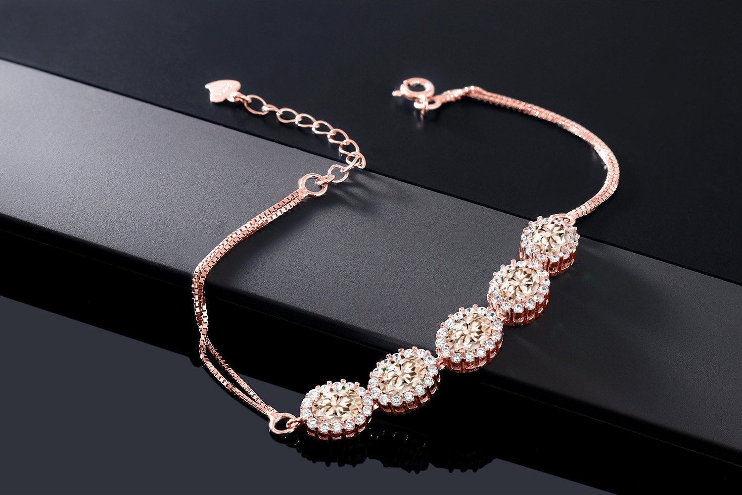 Gem Stone King 18K Rose Gold Plated Silver Peach Morganite Tennis Bracelet For Women (4.29 Cttw, Oval 7X5MM, 7 inches + 1.5 inches Extender)