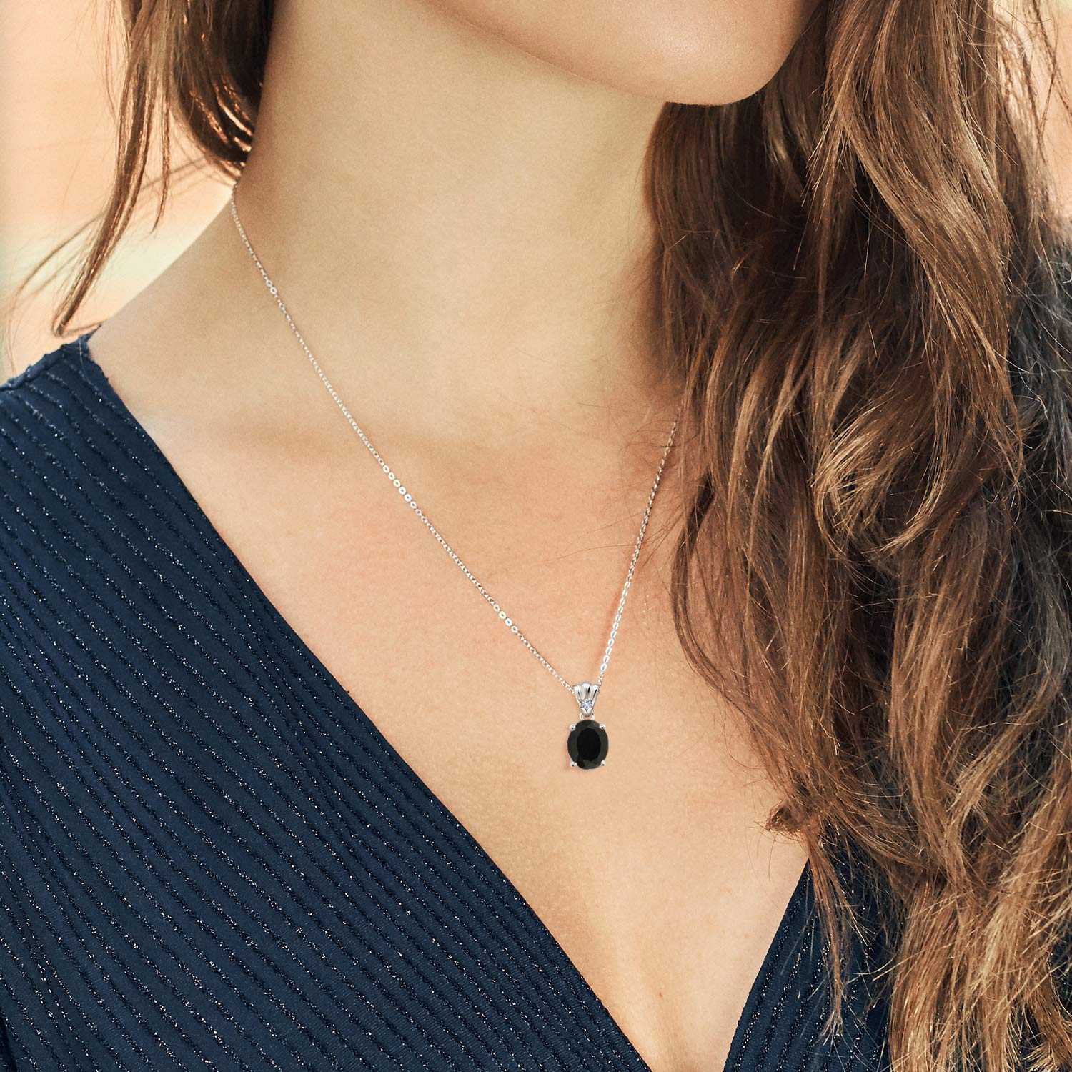 Gem Stone King 925 Sterling Silver Black Onyx and White Created Sapphire Pendant Necklace For Women (3.04 Cttw, Oval 11X9MM, with 18 Inch Silver Chain)
