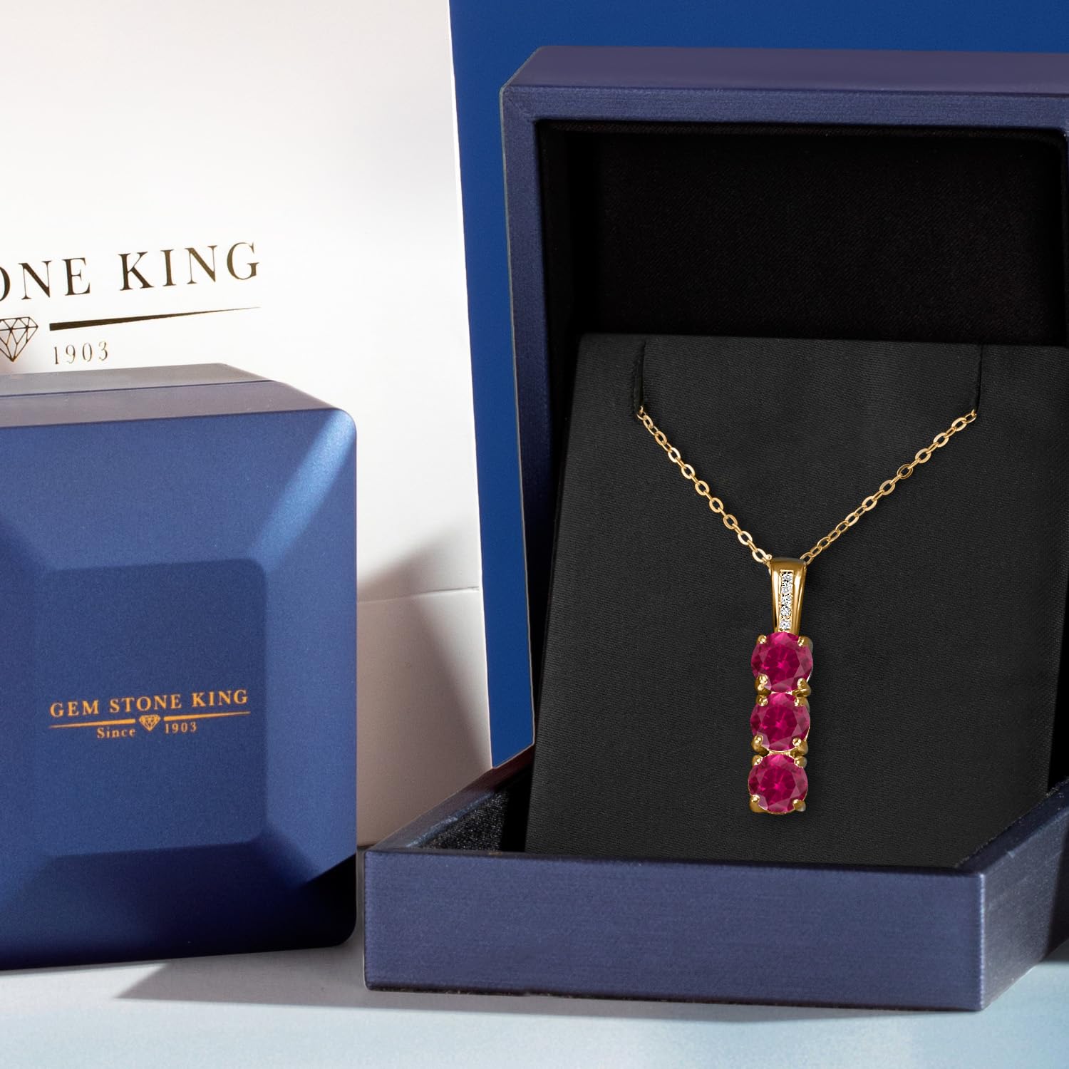 Gem Stone King Red Created Ruby and Diamond 18K Yellow Gold Plated Silver 3 Stone Pendant Necklace For Women (1.84 Cttw, Round 5MM, with 18 Inch Chain)