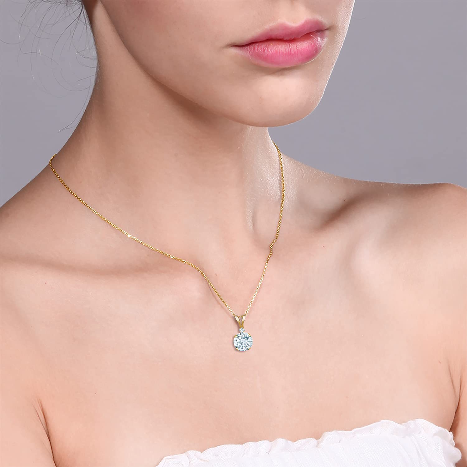 Gem Stone King 14K Yellow Gold Sky Blue Aquamarine and White Created Sapphire Pendant Necklace For Women (0.77 Cttw, Round 6MM, with 18 Inch Chain)