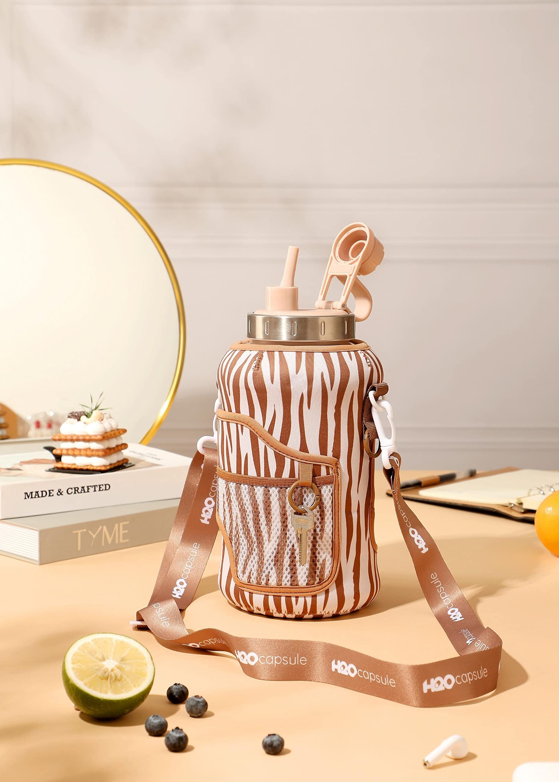 H2O Capsule 2.2L Half Gallon Wide Mouth Water Bottle with Storage Sleeve and Removable Straw - Hydration Tracker Jug with Measurements Marked β Shatterproof BPA-Free, (Libra Zebra)