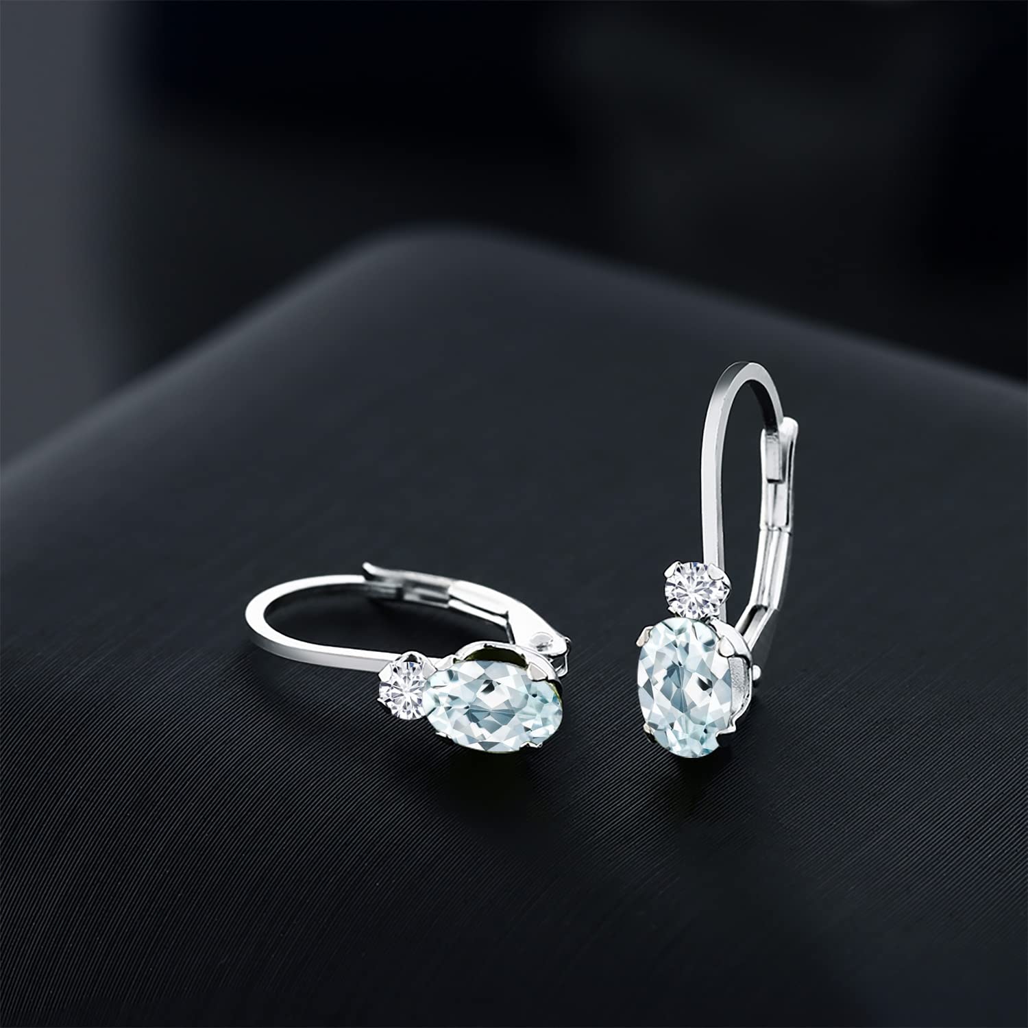Gem Stone King 925 Sterling Silver Sky Blue Aquamarine & White Diamond Leverback Earrings For Women (1.07 Cttw, Gemstone Birthstone, Oval 6X4MM, Round 2MM, 3/4 Inch)