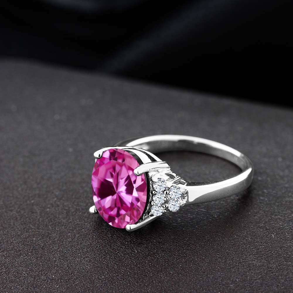 Gem Stone King 925 Sterling Silver Pink Created Sapphire Ring For Women (6.30 Cttw, Oval 12X10MM, Available 5,6,7,8,9) (Size 6)