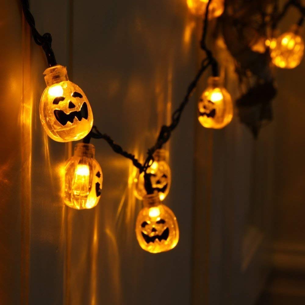 Halloween Pumpkin String Lights Eurus Home 33 ft 50 LED Halloween Lights | Solar Powered Pumpkin Lights with 8 Lighting Modes Jack-O-Lantern Decorative Lights for Indoor Outdoor Halloween Party IP65