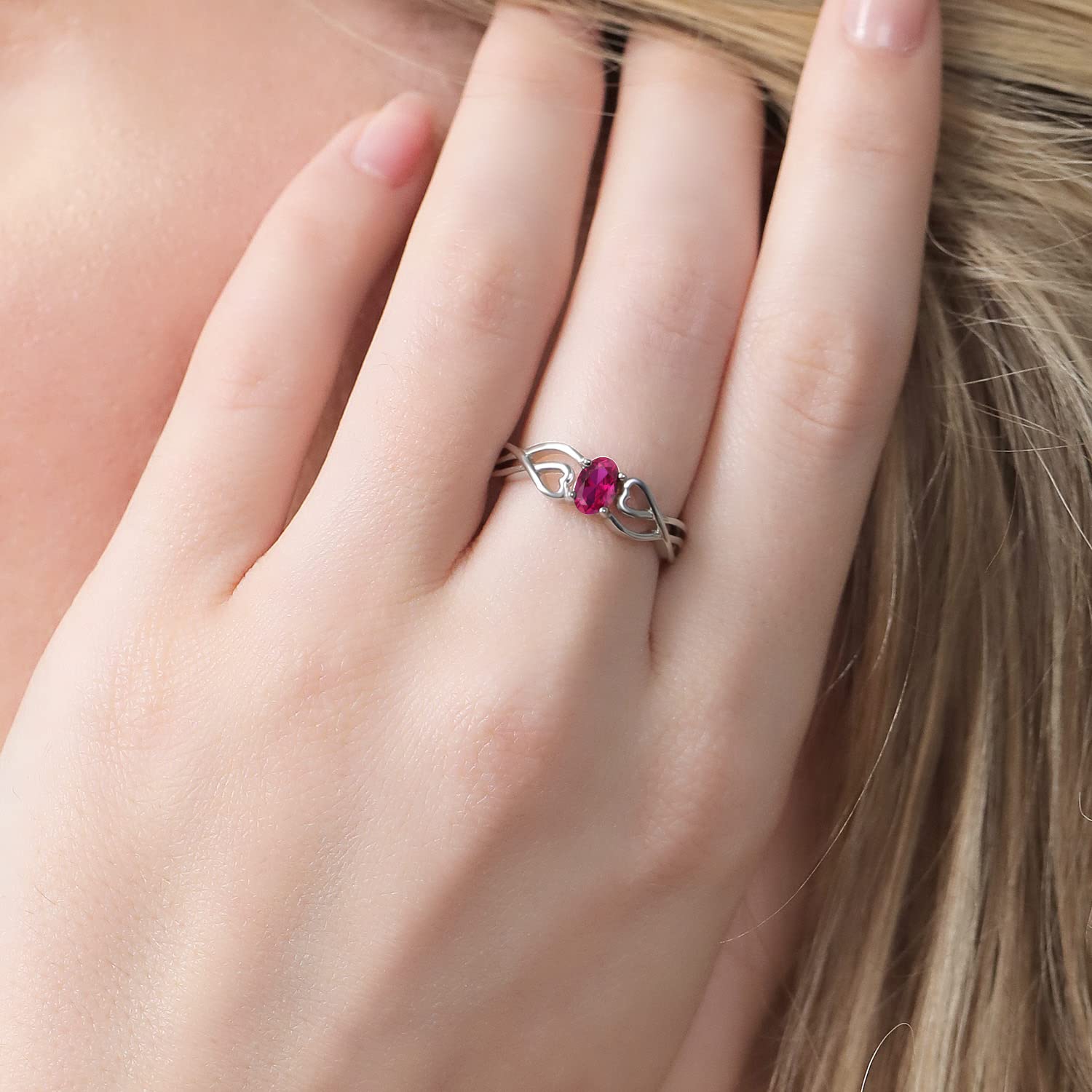 Gem Stone King 925 Sterling Silver Red Created Ruby Women Engagement Ring (0.50 Ct Oval) (Size 8)