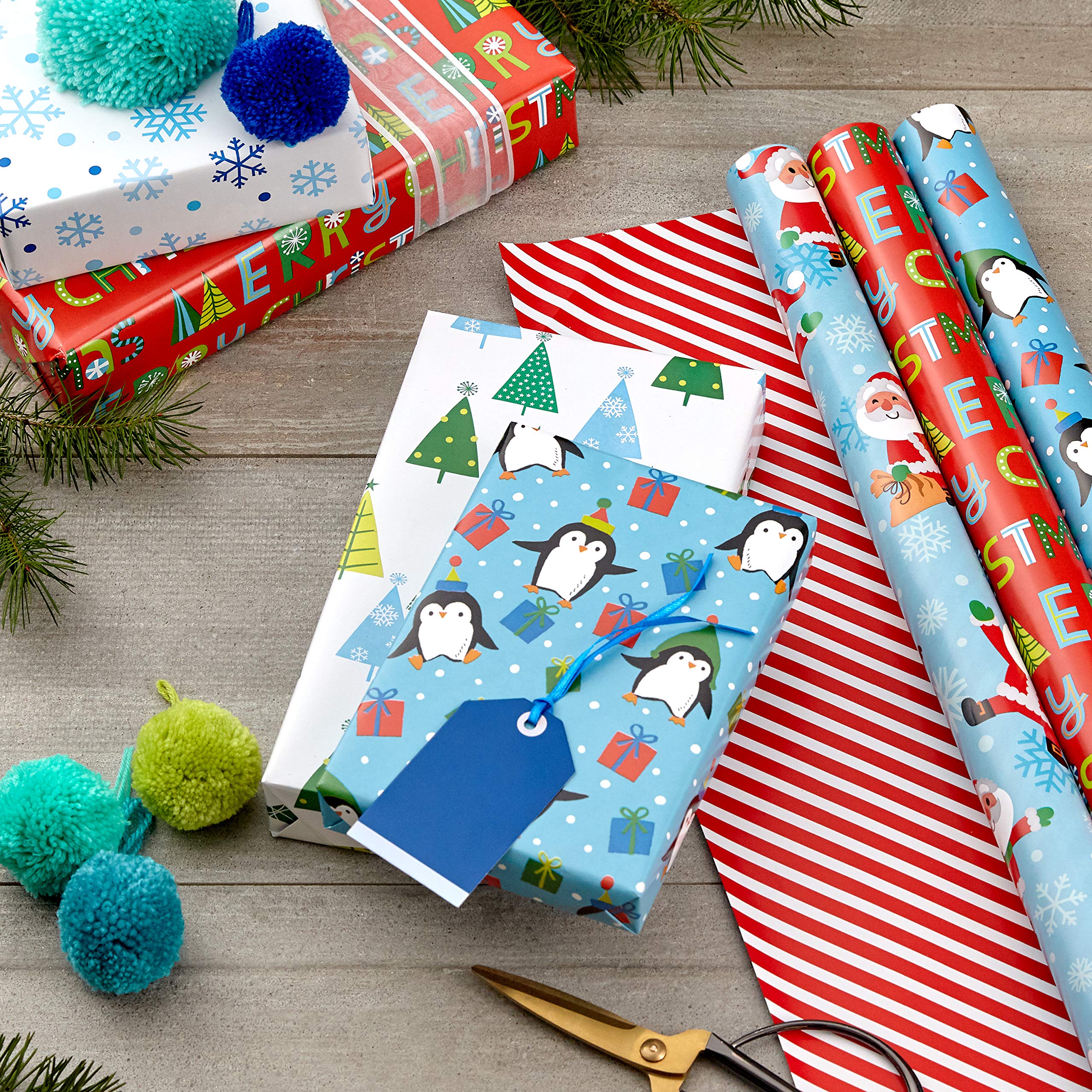 Hallmark Cute Reversible Christmas Wrapping Paper for Kids (3 Rolls: 120 sq. ft. ttl) Penguins, Santa, Trees, Stripes, Snowflakes, Merry Christmas"