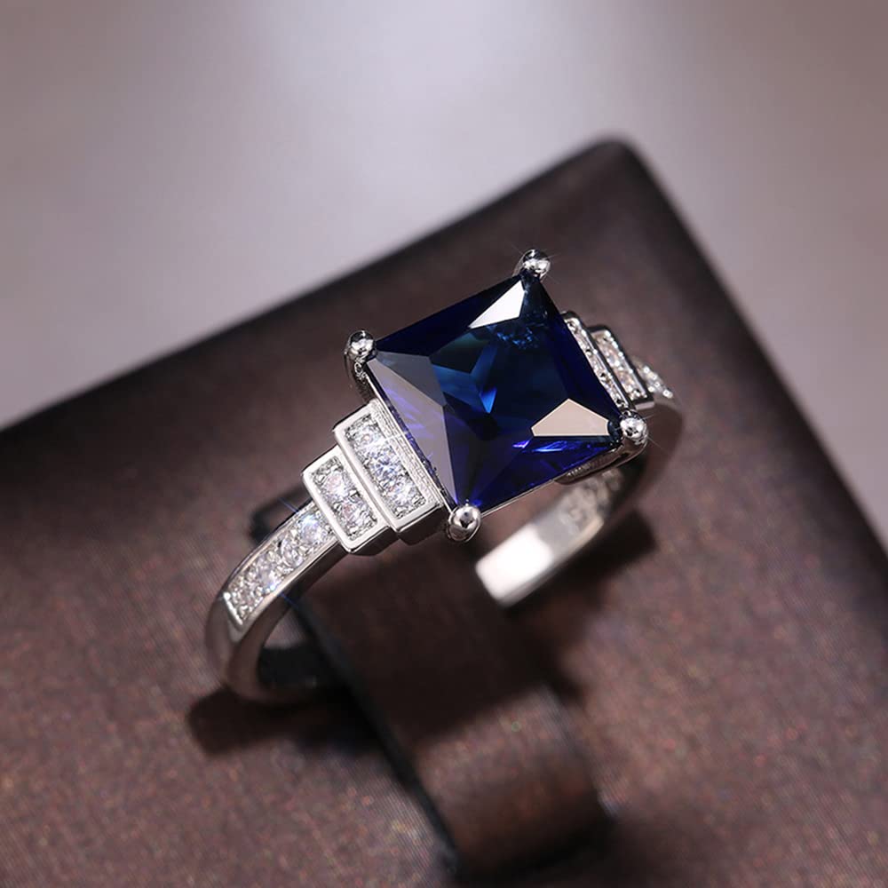Koguxuix 14K White Gold Plated Sterling Silver Perfect Princess Cut Blue Sapphire Round Clear CZ Crystal Diamond Women's Engagement Ring (Size 8)
