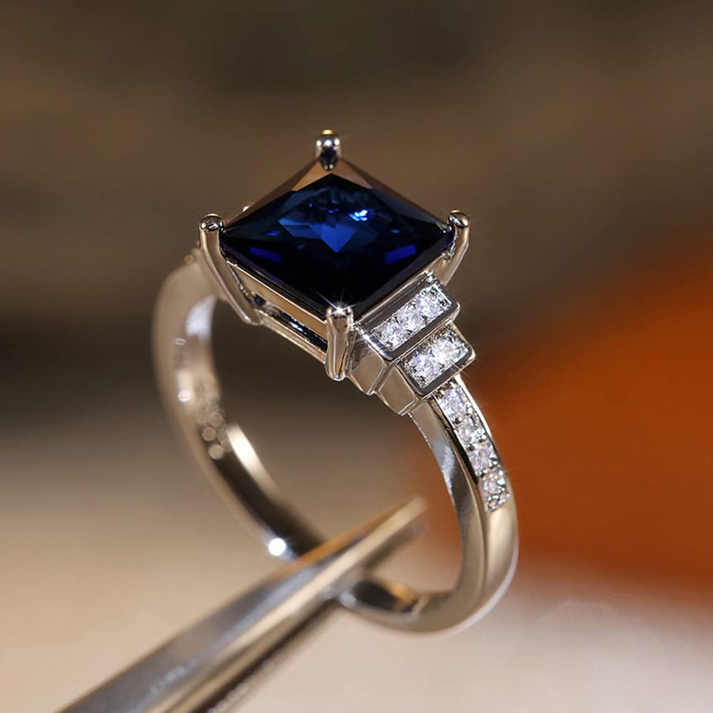 Koguxuix 14K White Gold Plated Sterling Silver Perfect Princess Cut Blue Sapphire Round Clear CZ Crystal Diamond Women's Engagement Ring (Size 8)