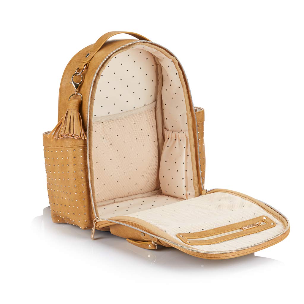 Itzy Ritzy Chelsea + Cole Mini Diaper Bag Backpack - Studded Mini Backpack with Changing Pad, 8 Pockets, Rubber Feet & Tassel - Caramel with Sweetheart Print Interior and Gold Hardware