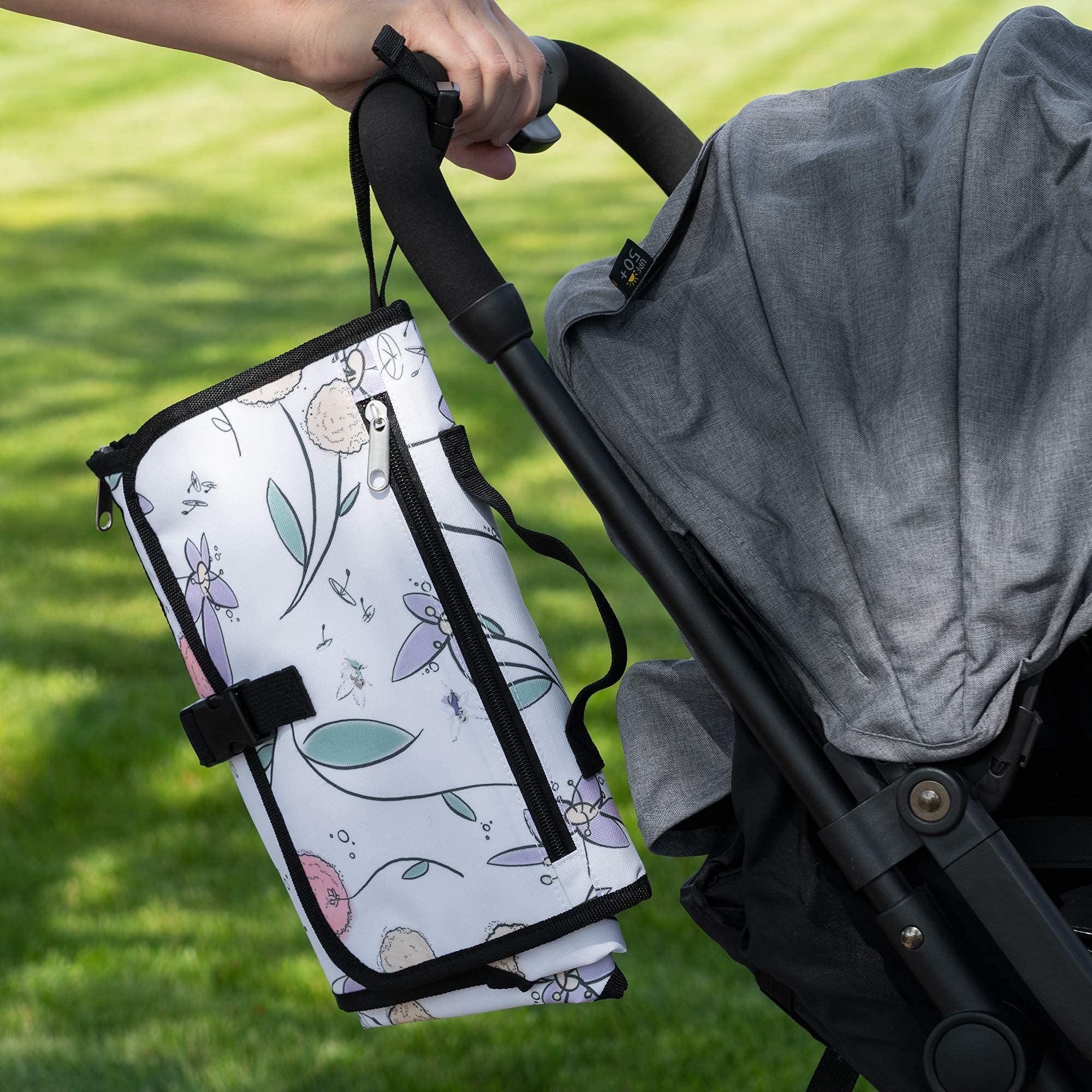 JumpOff Jo β Portable Changing Pad / Diaper Bag with Padded Changing Station, Easy Travel Changing Pad, Includes Handy Storage Pockets for Baby Necessities β Fairy Blossom
