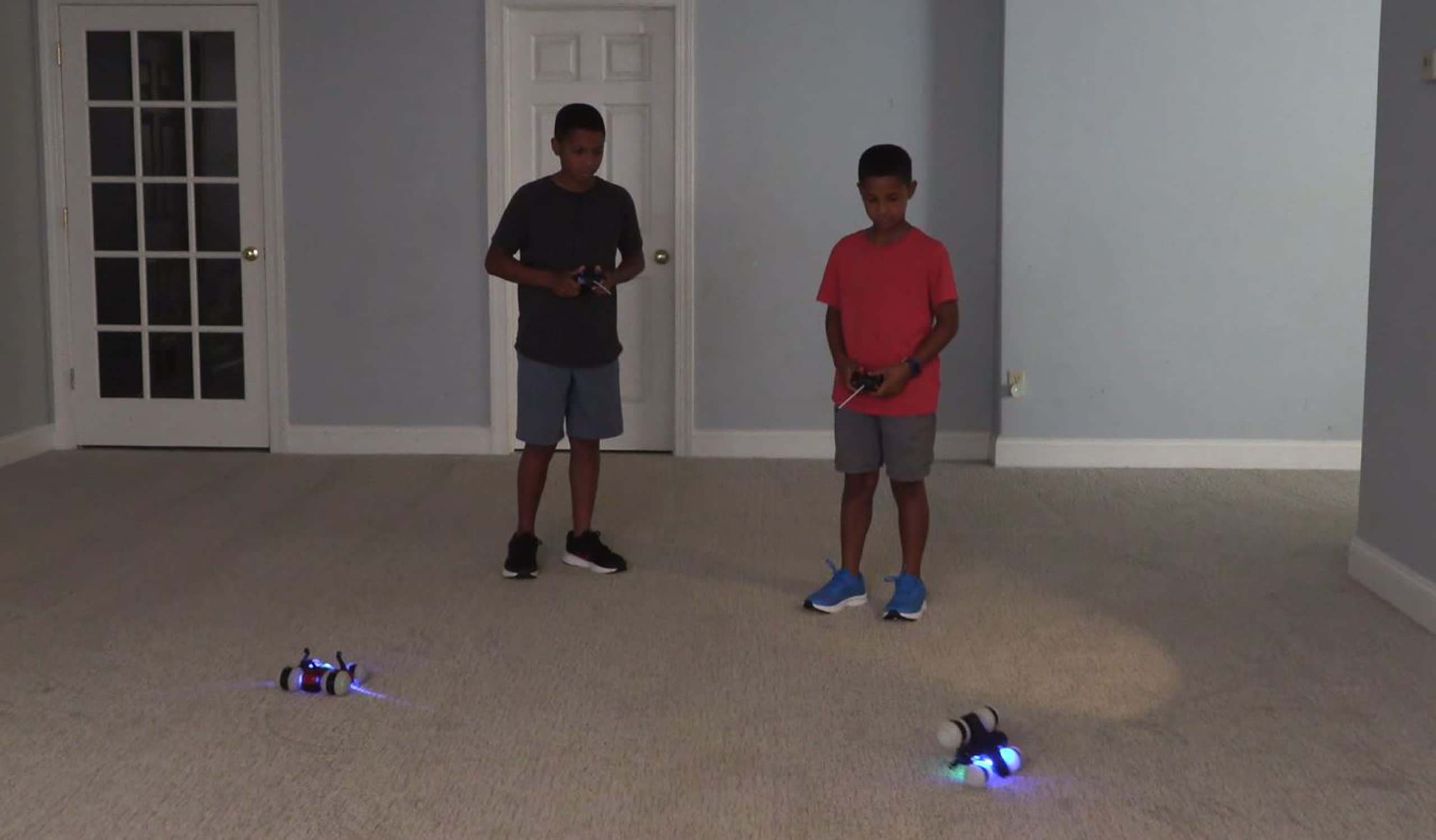 Mindscope Set of 2 HoverQuad Xtreme Radio Control Stunt Action Light Up Vehicles Red and Blue