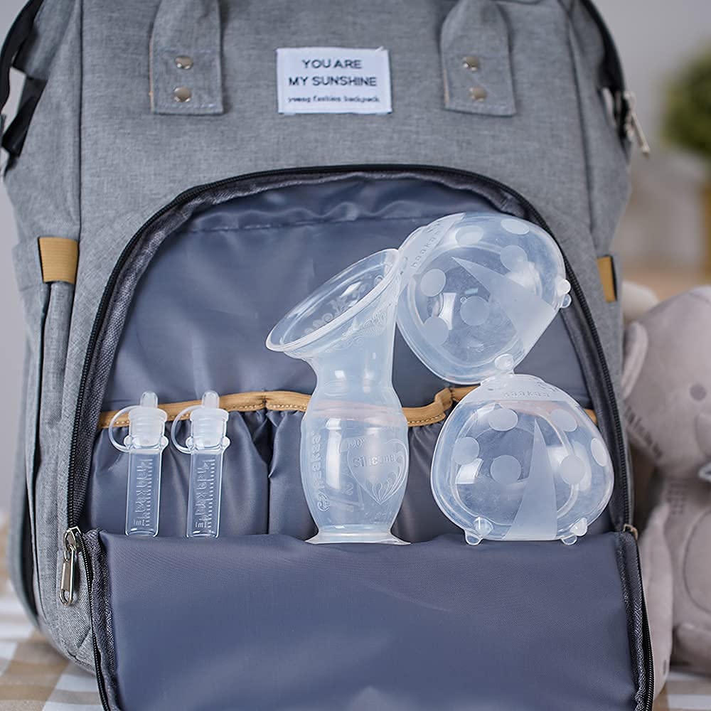 haakaa Manual Breast Pump & Ladybug Breast Milk Collector & Colostrum Collector Set (100ml/4oz with Base)