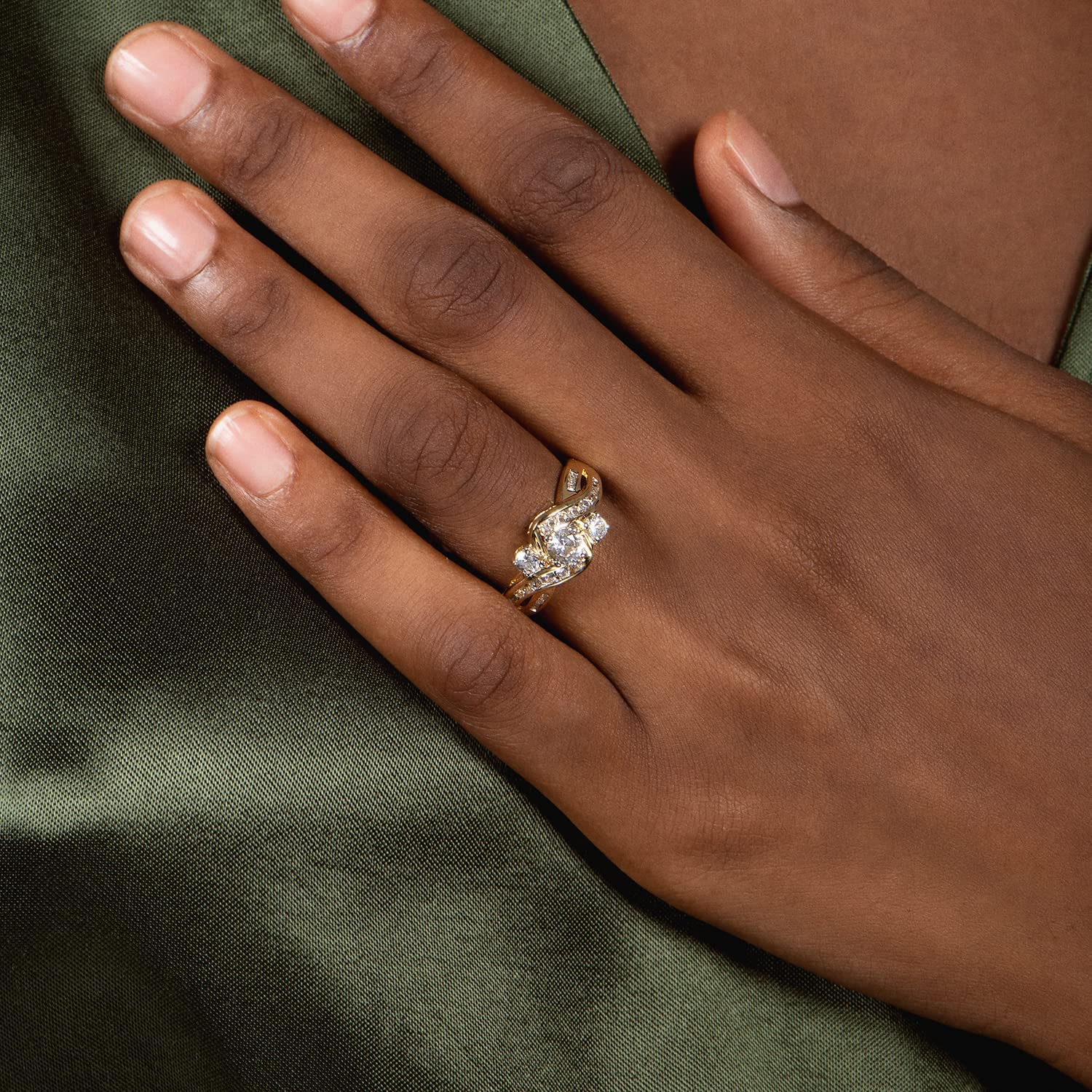 Jewelili 14K Yellow gold over Sterling Silver 3 Stone Round Created White Sapphire and Natural White Round Diamond Accent Ring, Size 6