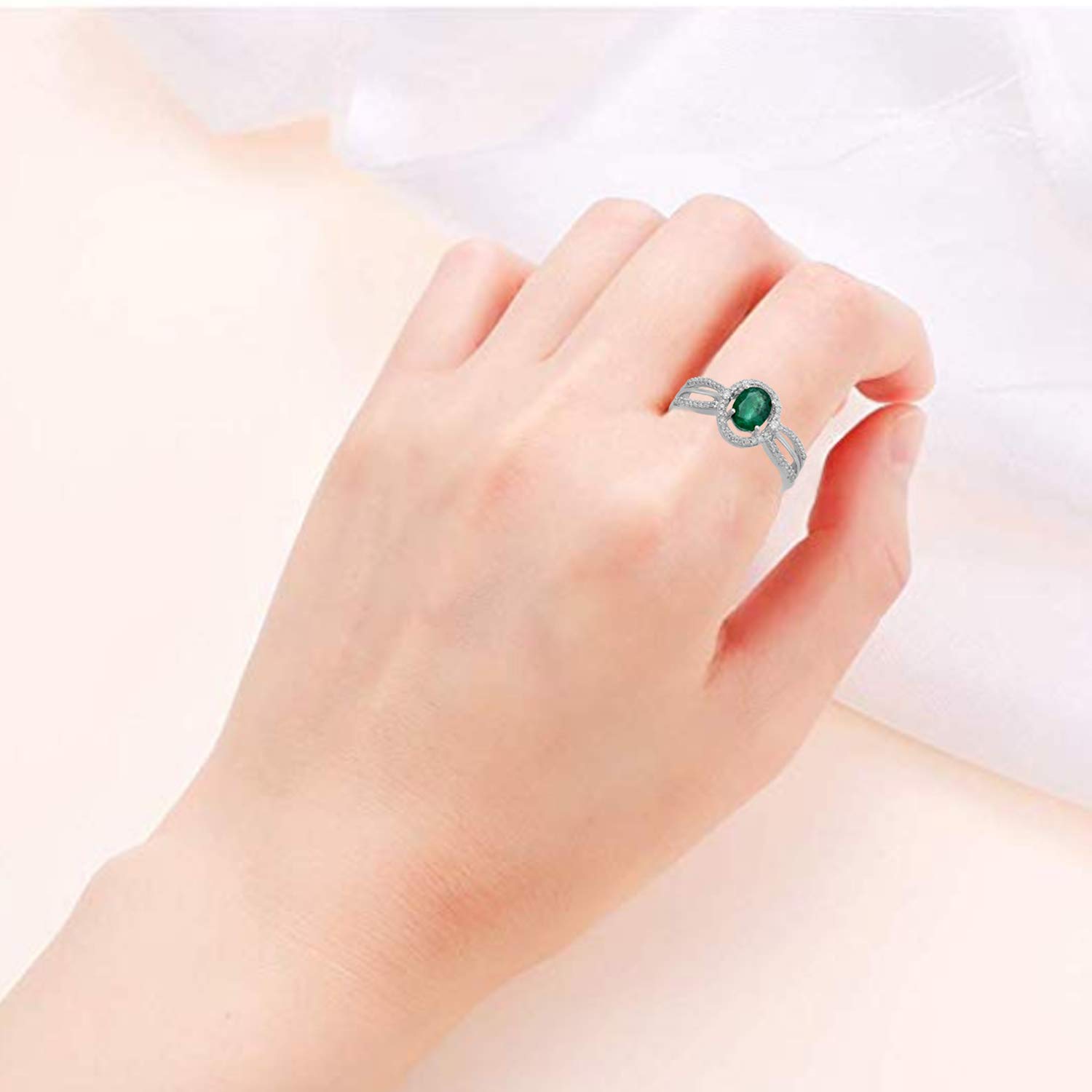 Jewelili 10K White Gold 7x5MM Oval Shape Emerald and 1/5 Cttw Natural White Round Diamond Ring, Size 7