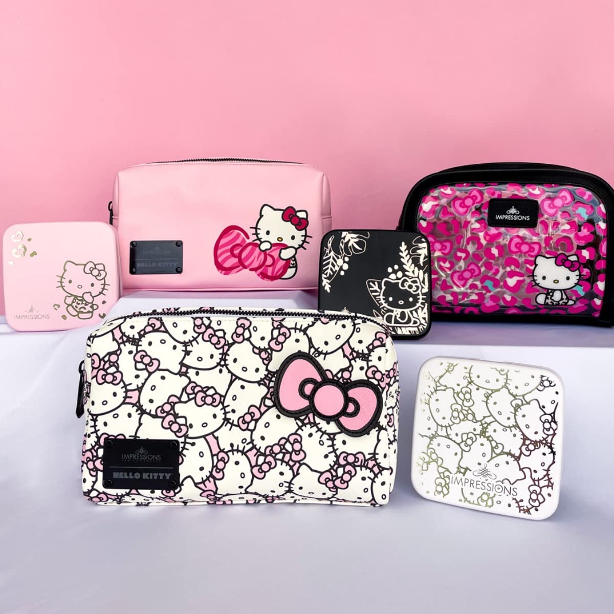 Impressions Vanity Hello Kitty Cosmetic Pouch with Waterproof Faux Leather, Zippered Bag For Travel Size Toiletries, Makeup Bag Organizer With Inside Pocket With Extra Slip Pocket (White/Pink)