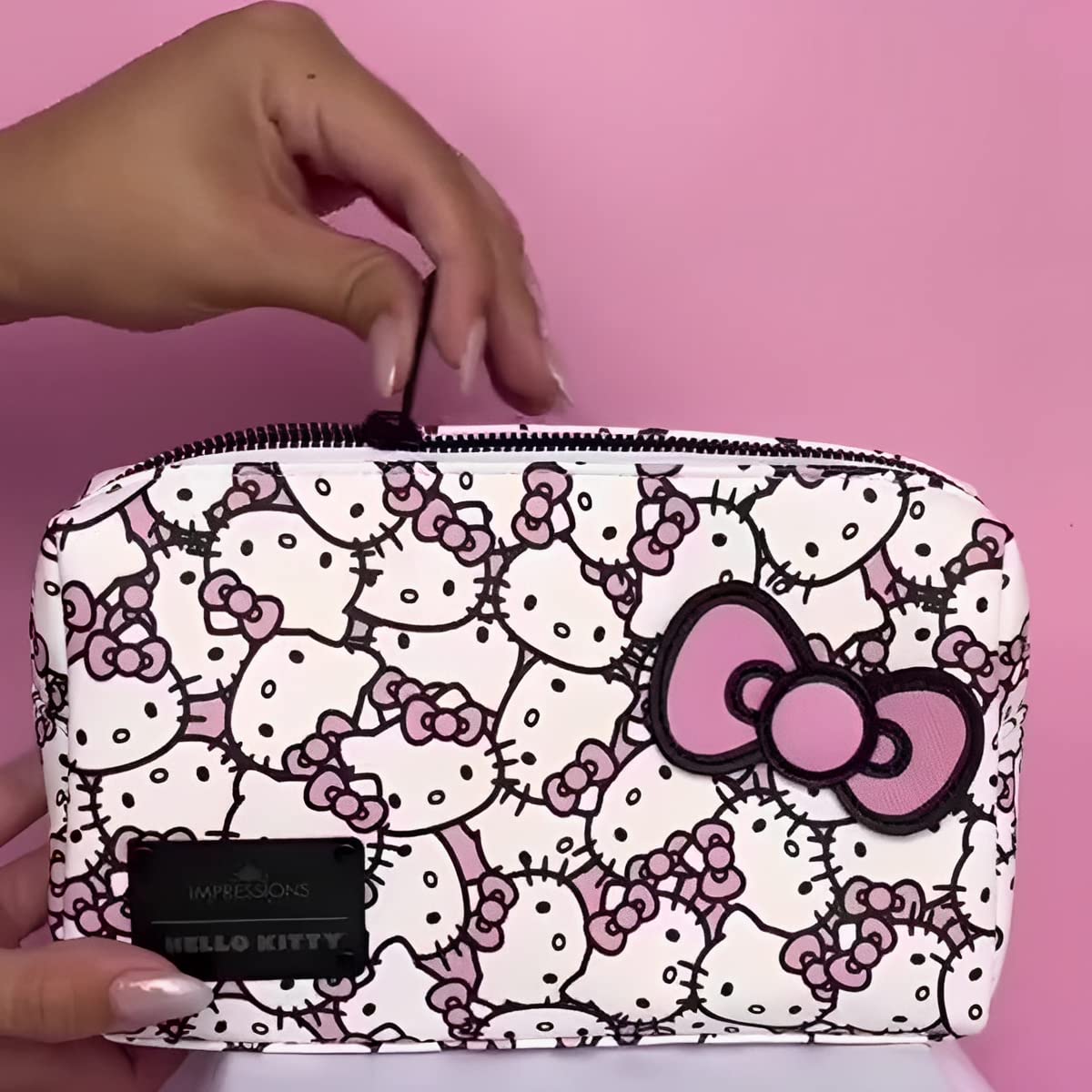 Impressions Vanity Hello Kitty Cosmetic Pouch with Waterproof Faux Leather, Zippered Bag For Travel Size Toiletries, Makeup Bag Organizer With Inside Pocket With Extra Slip Pocket (White/Pink)
